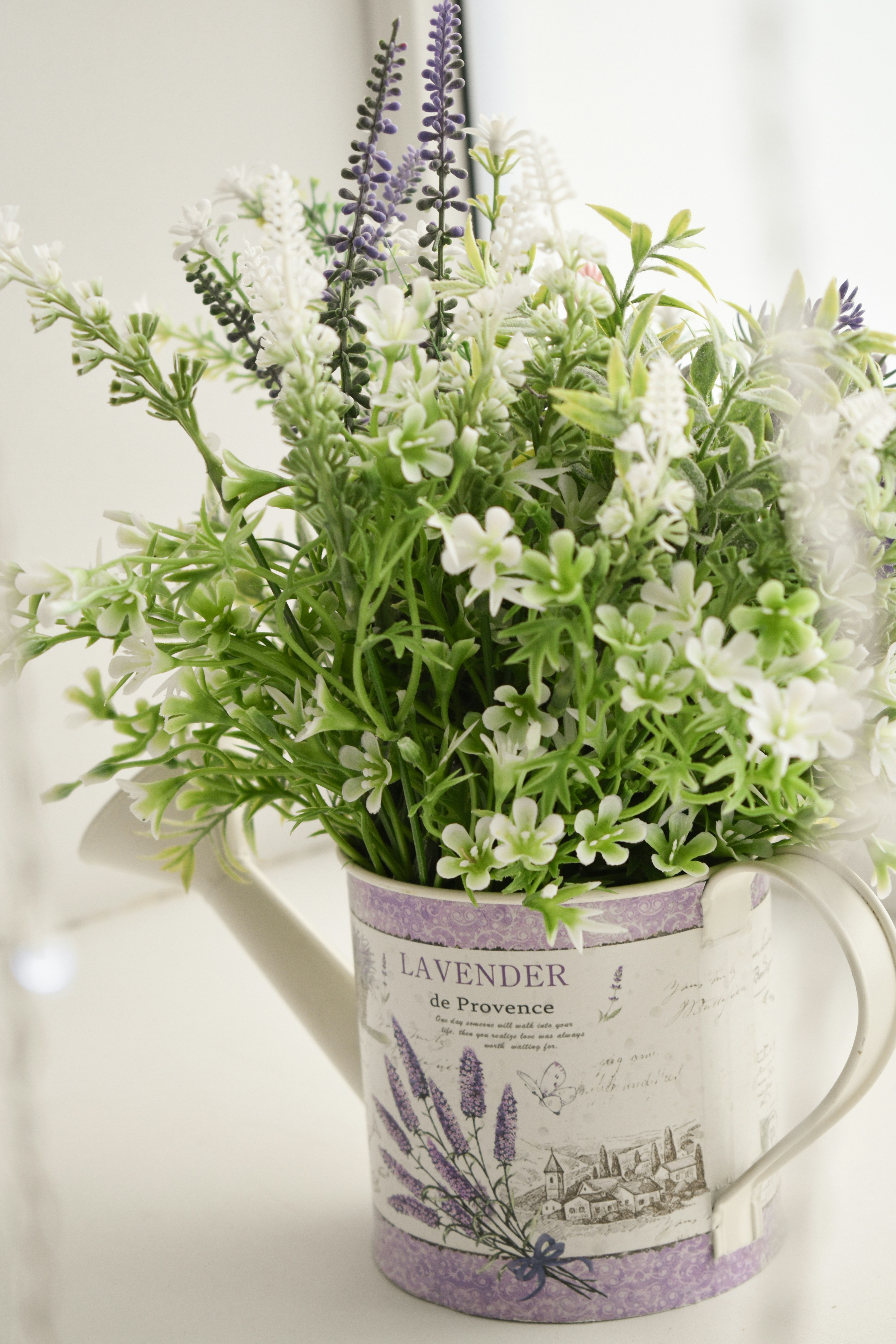 Pastel Lavender Bouquet Nestled in a Lavender-Print Metal Watering Can