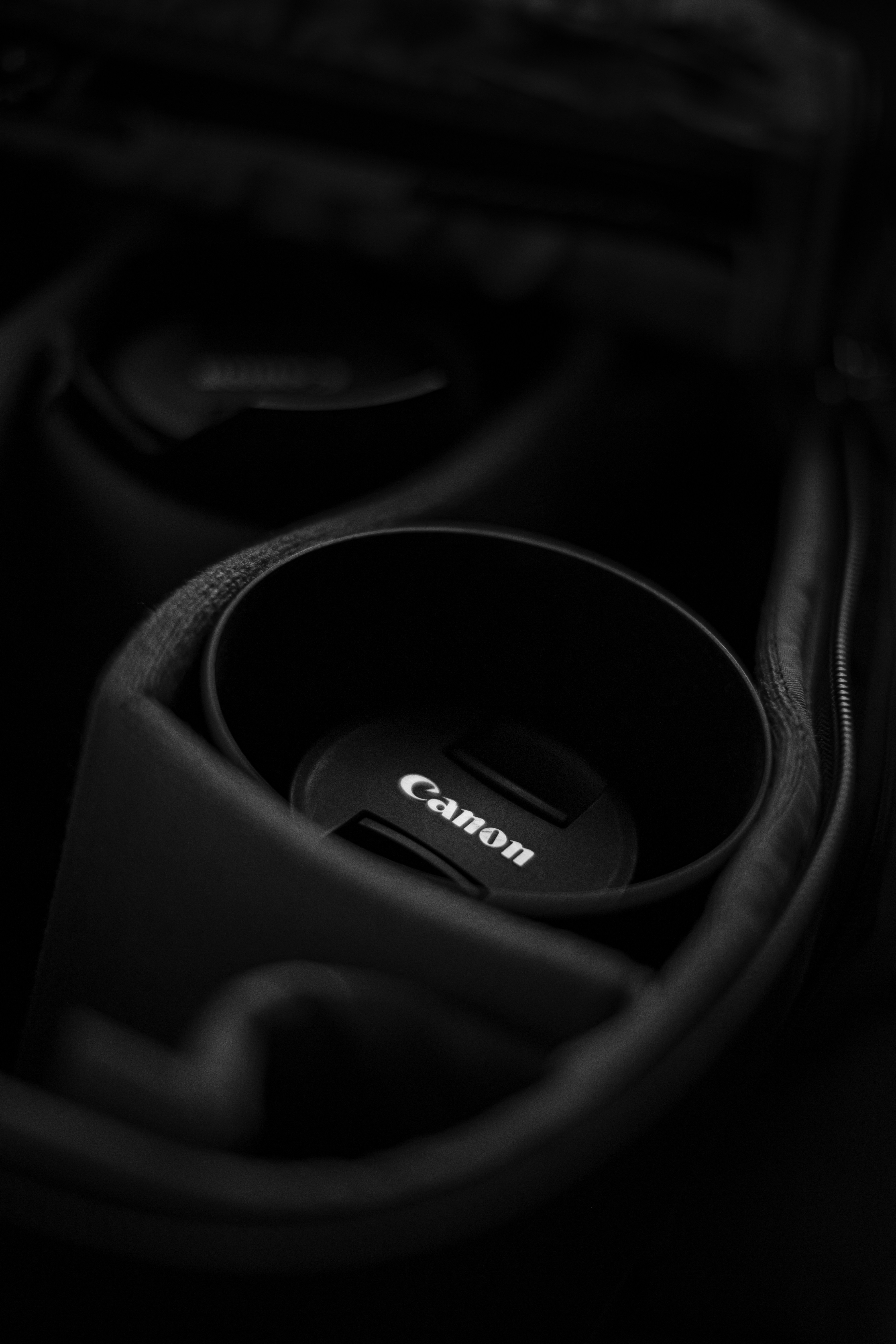 Canon Lens Cap Glimmer: A Quiet Inside Moment