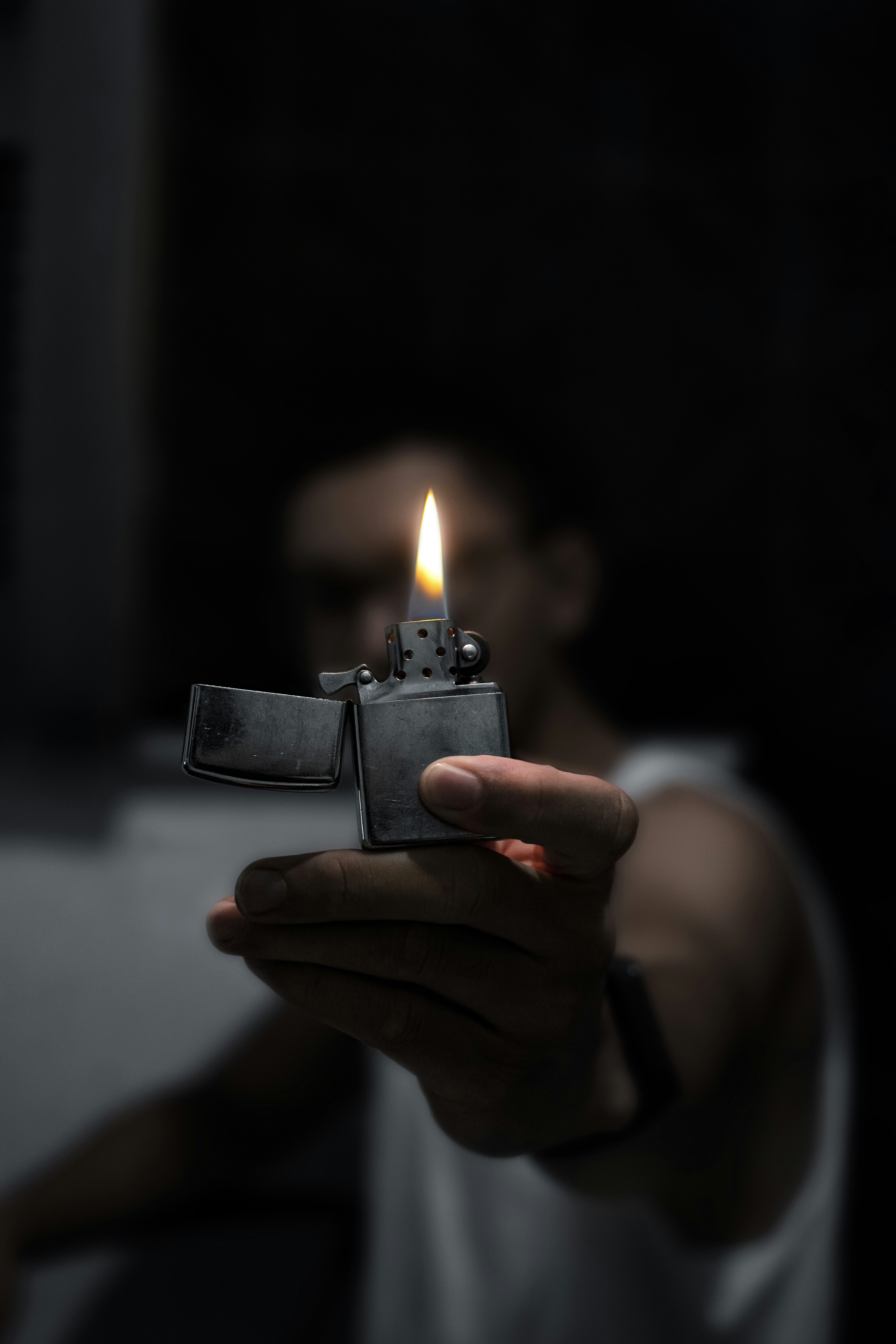 Person holding black flip lighter photo – Free Human Image on Unsplash