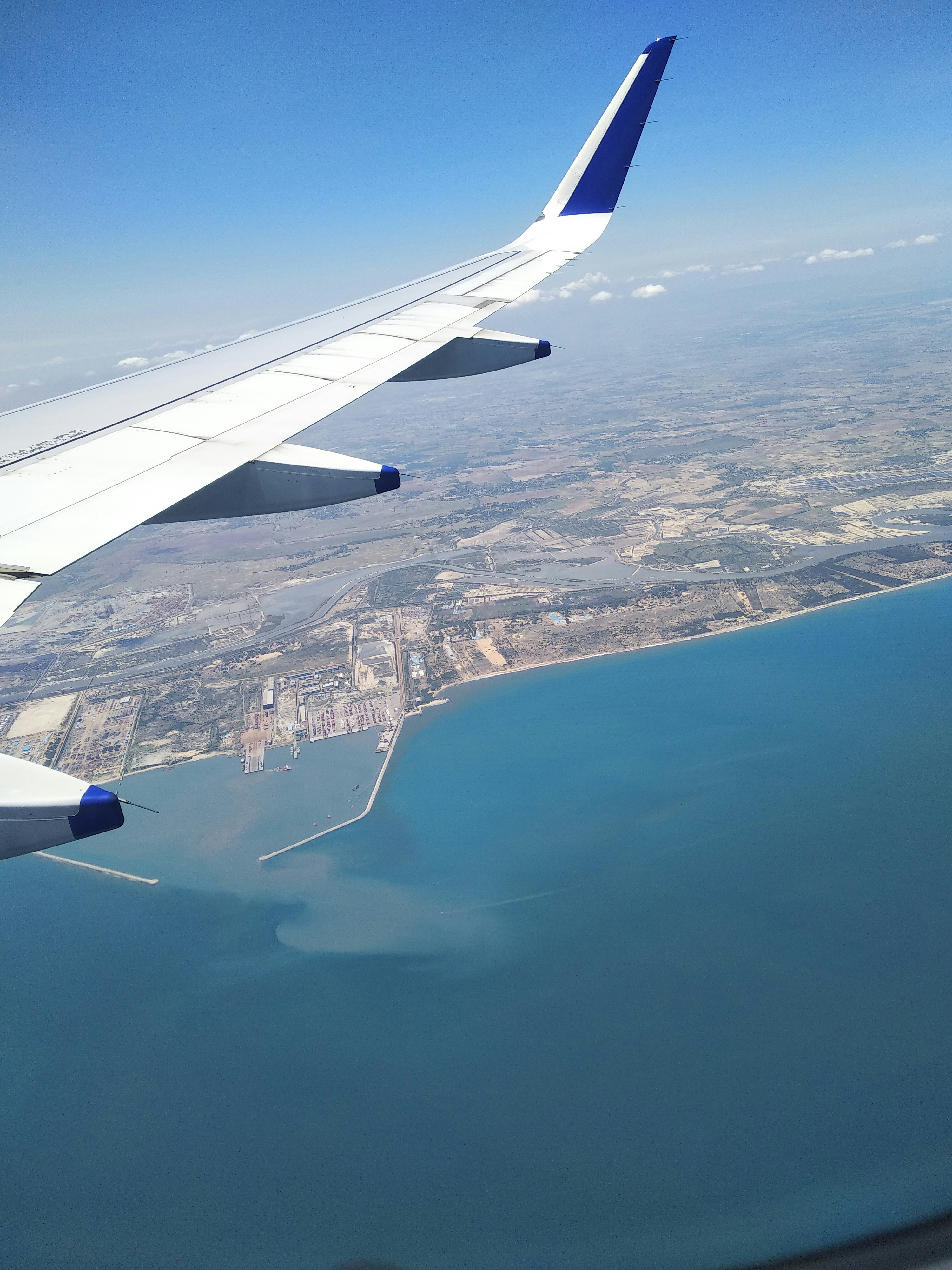 White airplane wing over the city during daytime photo – Free Landscape ...