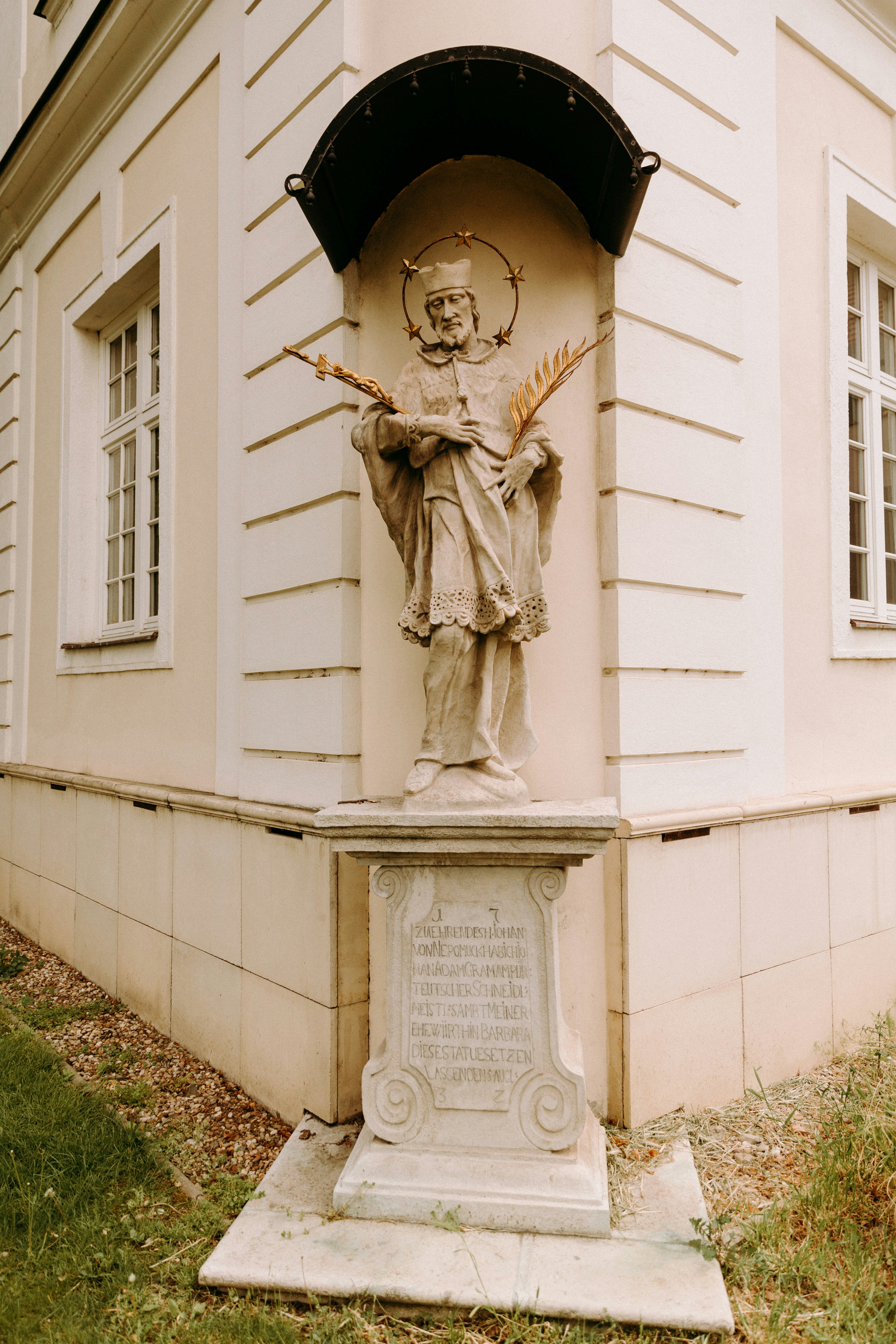 statue of st. Ján Nepomucký (sculpture of St John of Nepomuk) on the building of  the Faculty of Health and Social Work, Trnava university, Trnava (University Square)