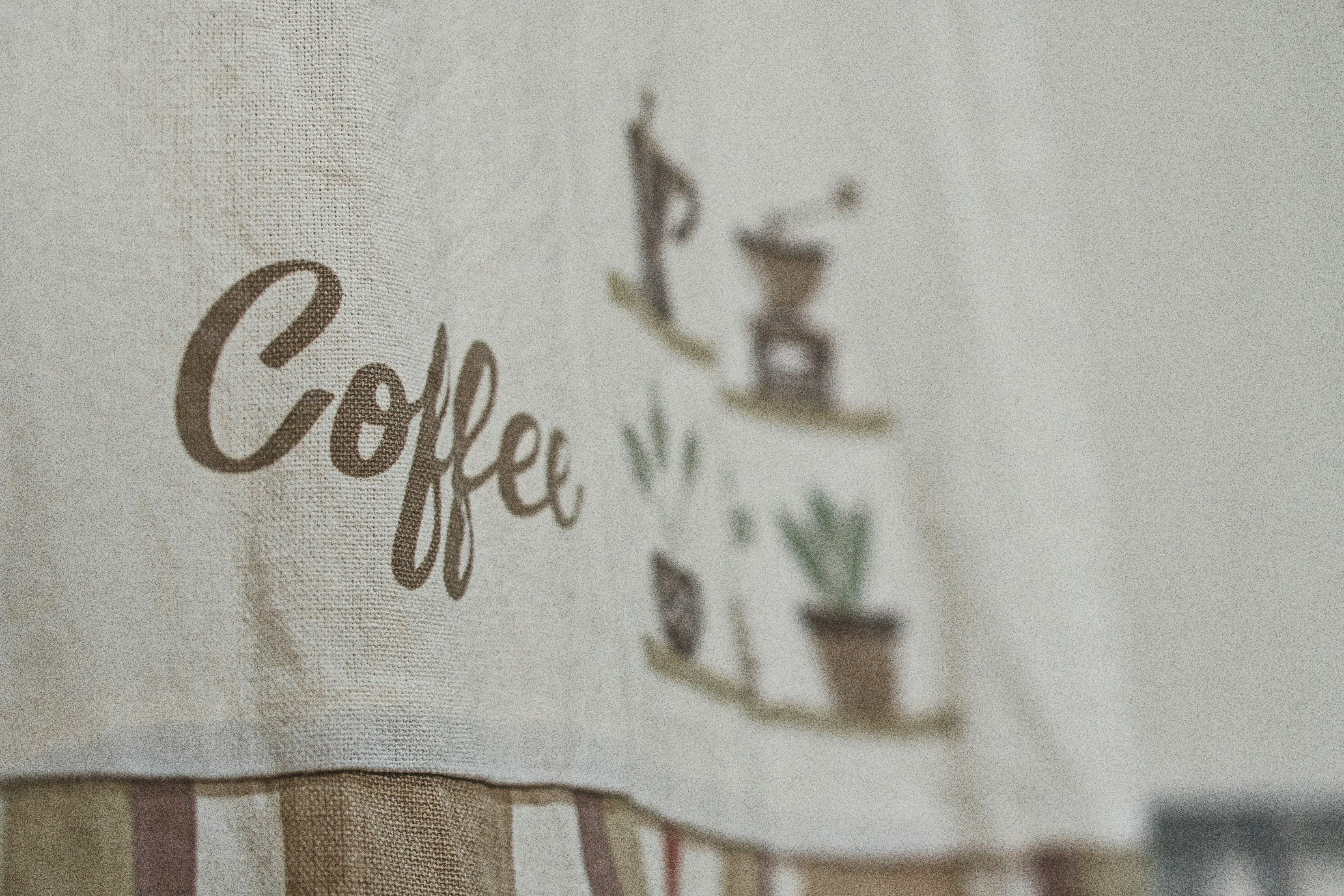 Textile Quiet: Coffee Script on Linen with Tiny Plant Motifs