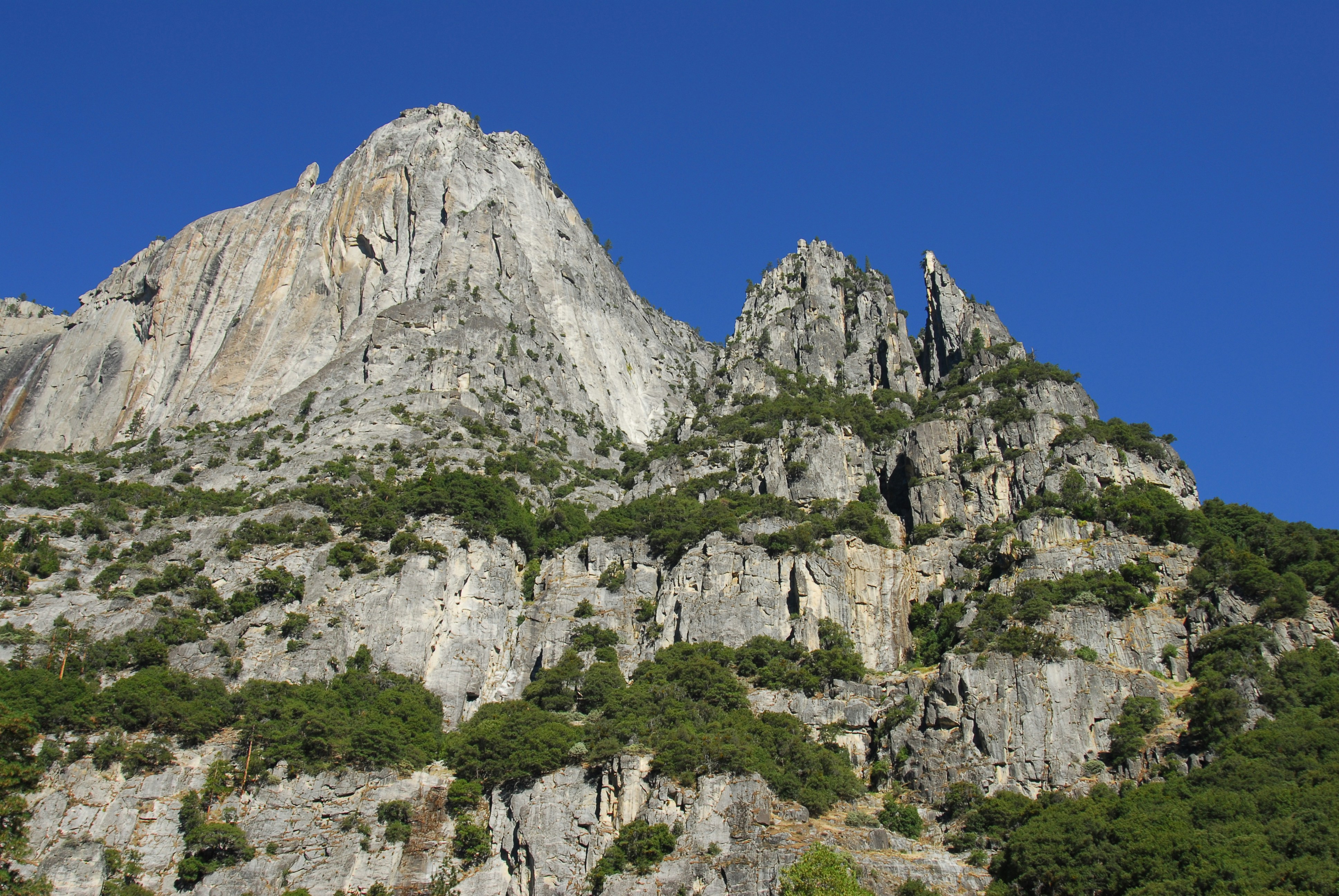 Gray rocky mountain under blue sky during daytime photo – Free Grey ...