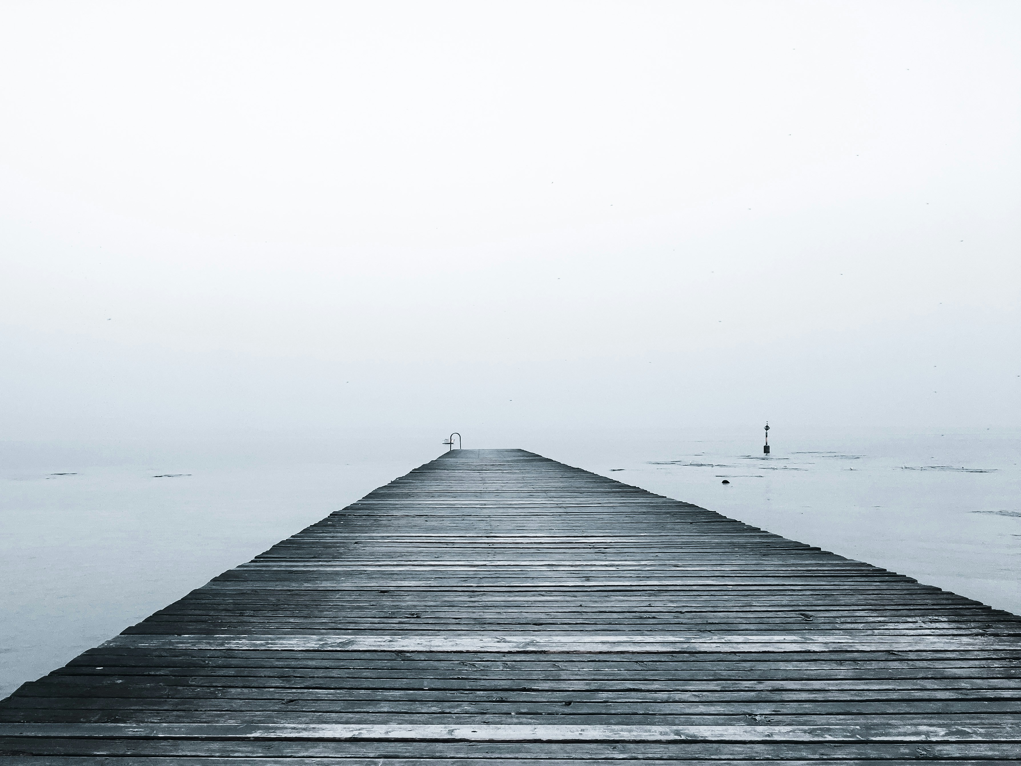 Grayscale photo of wooden dock photo – Free Italy Image on Unsplash