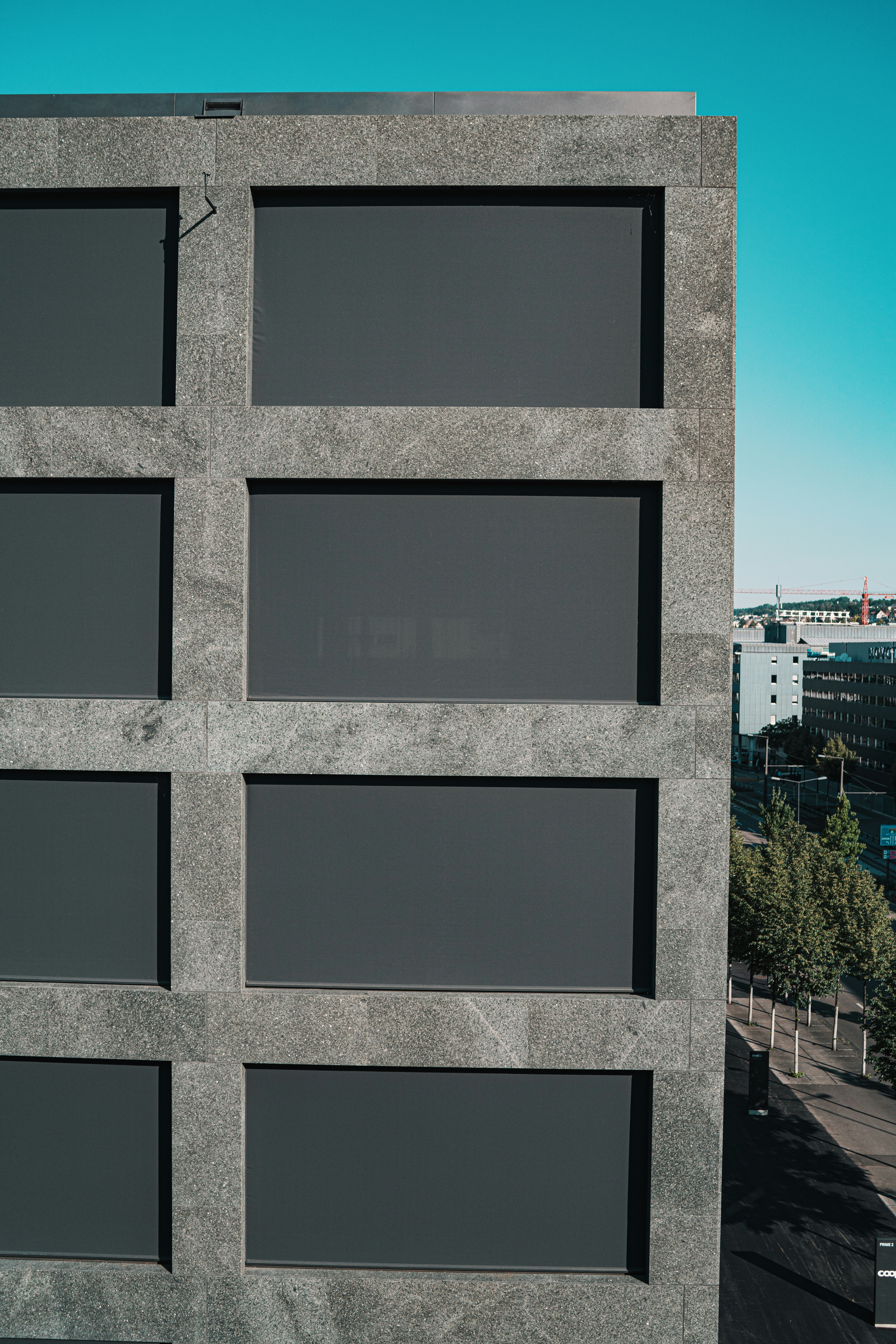 white concrete building under blue sky during daytime