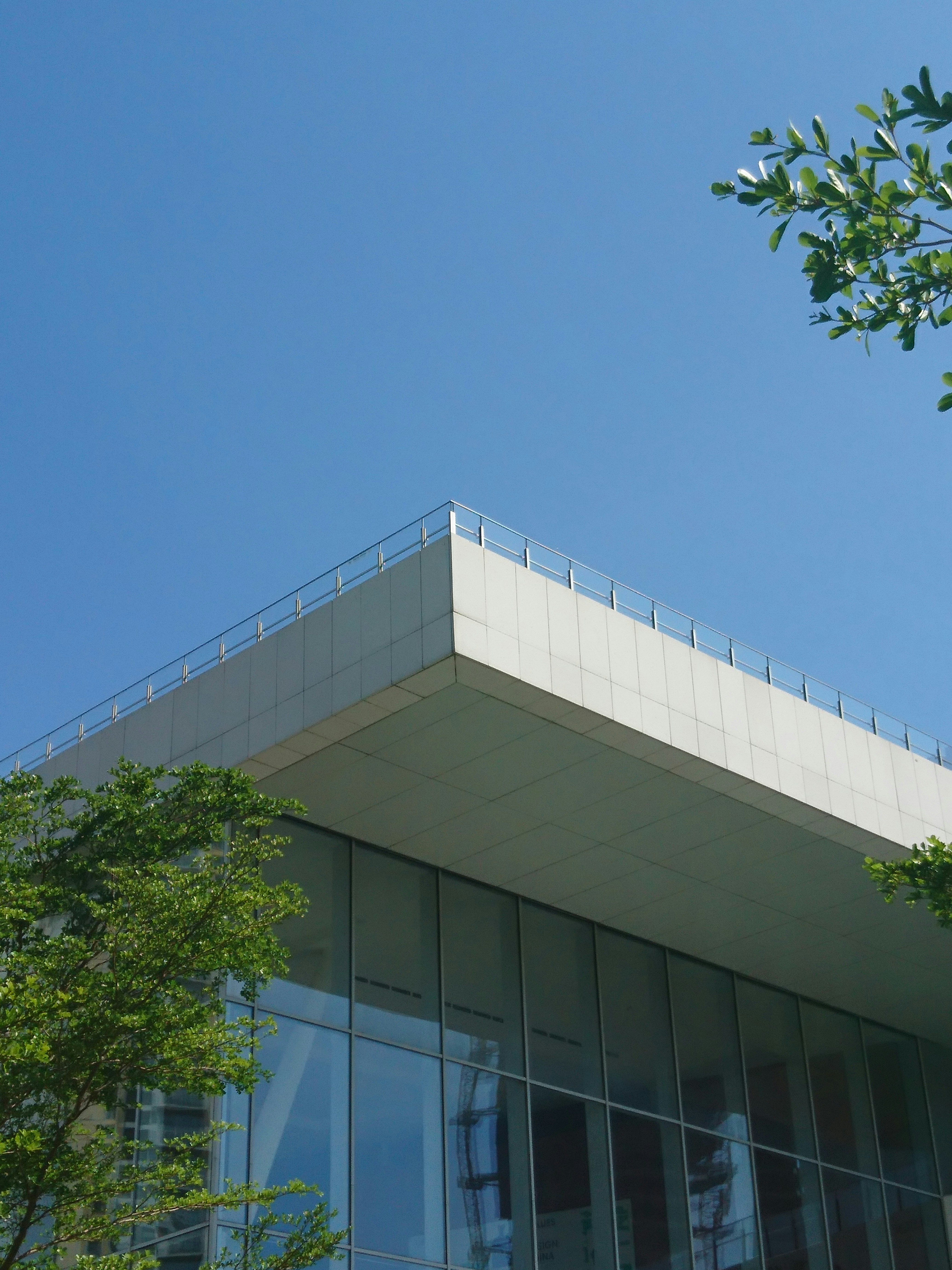 White concrete building under blue sky during daytime photo – Free ...