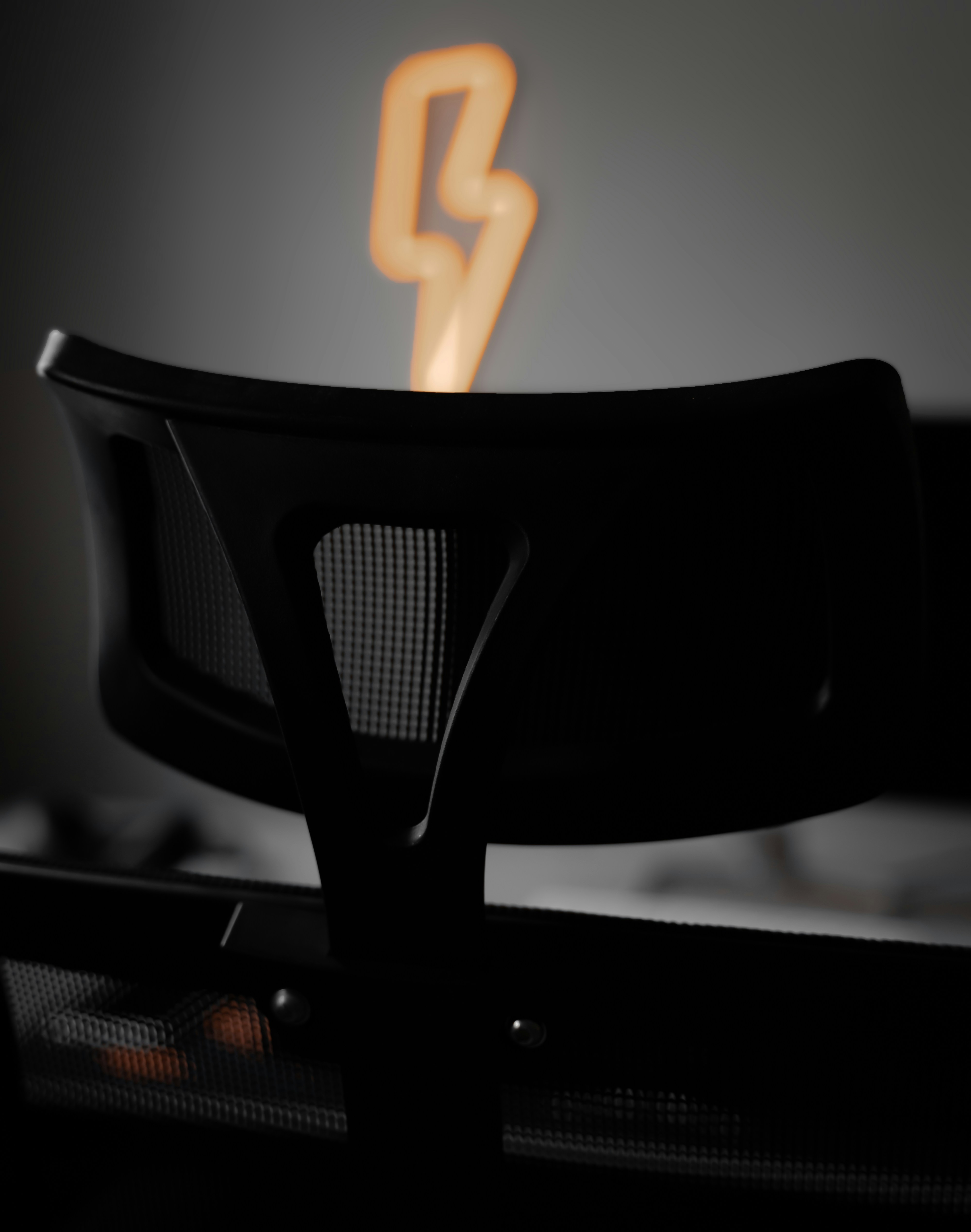 Neon Bolt Through the Silhouette: A Quiet Studio Moment