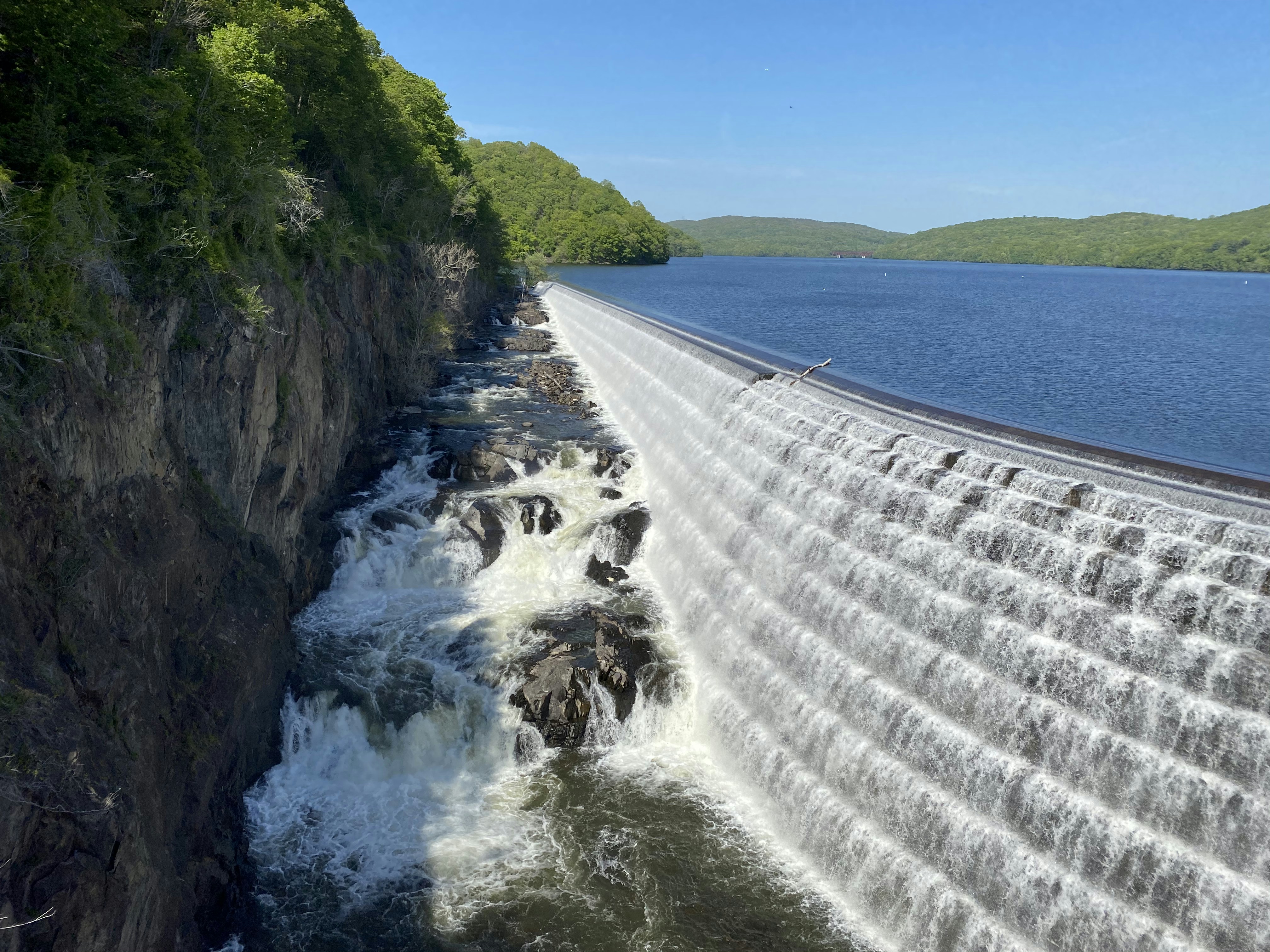 Spillway Ribbon: White Water Cascades Along the Dam's Edge