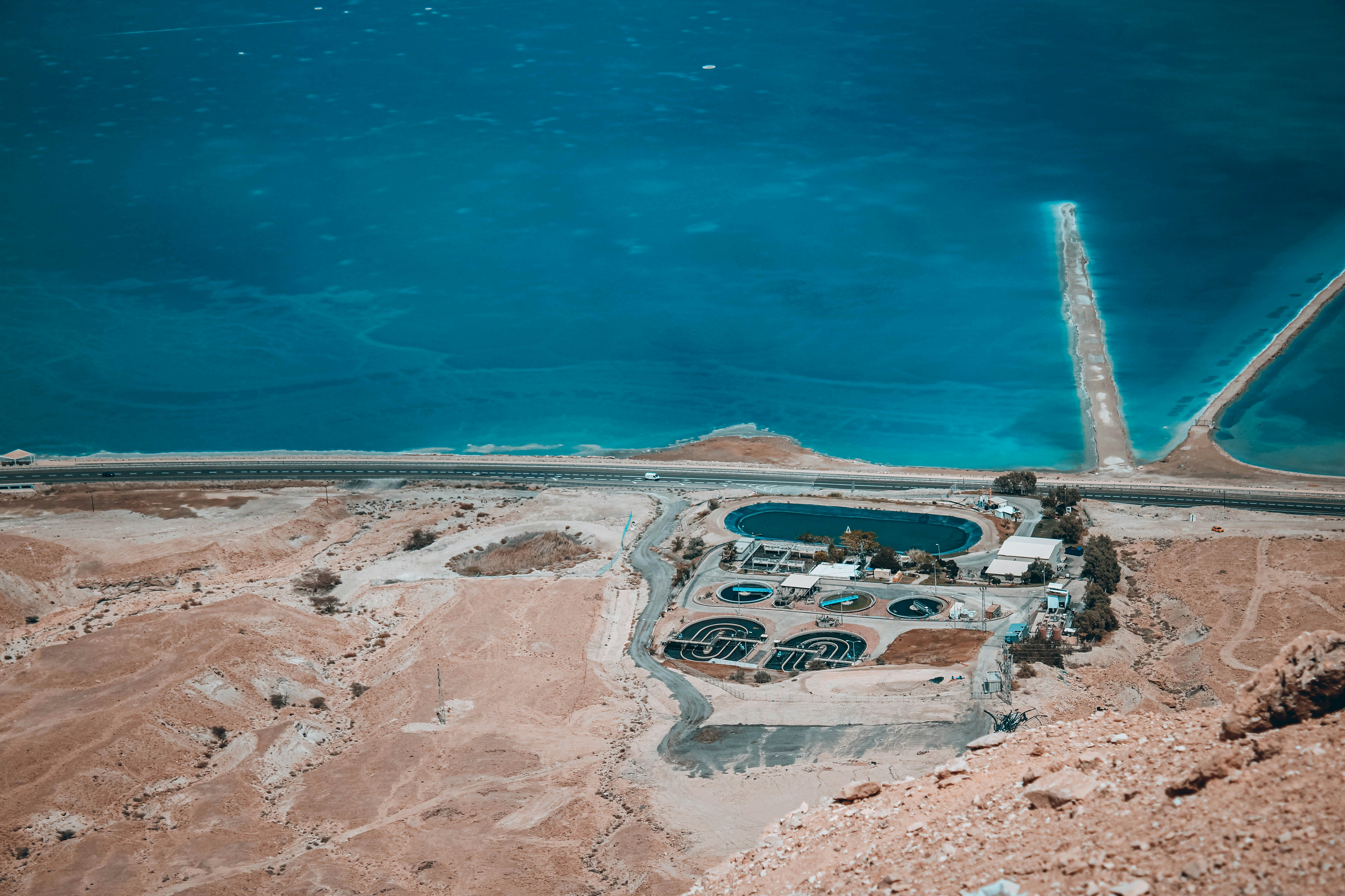 Deserted Coastline Microcosm: A Blue Saltwater Facility by the Dunes