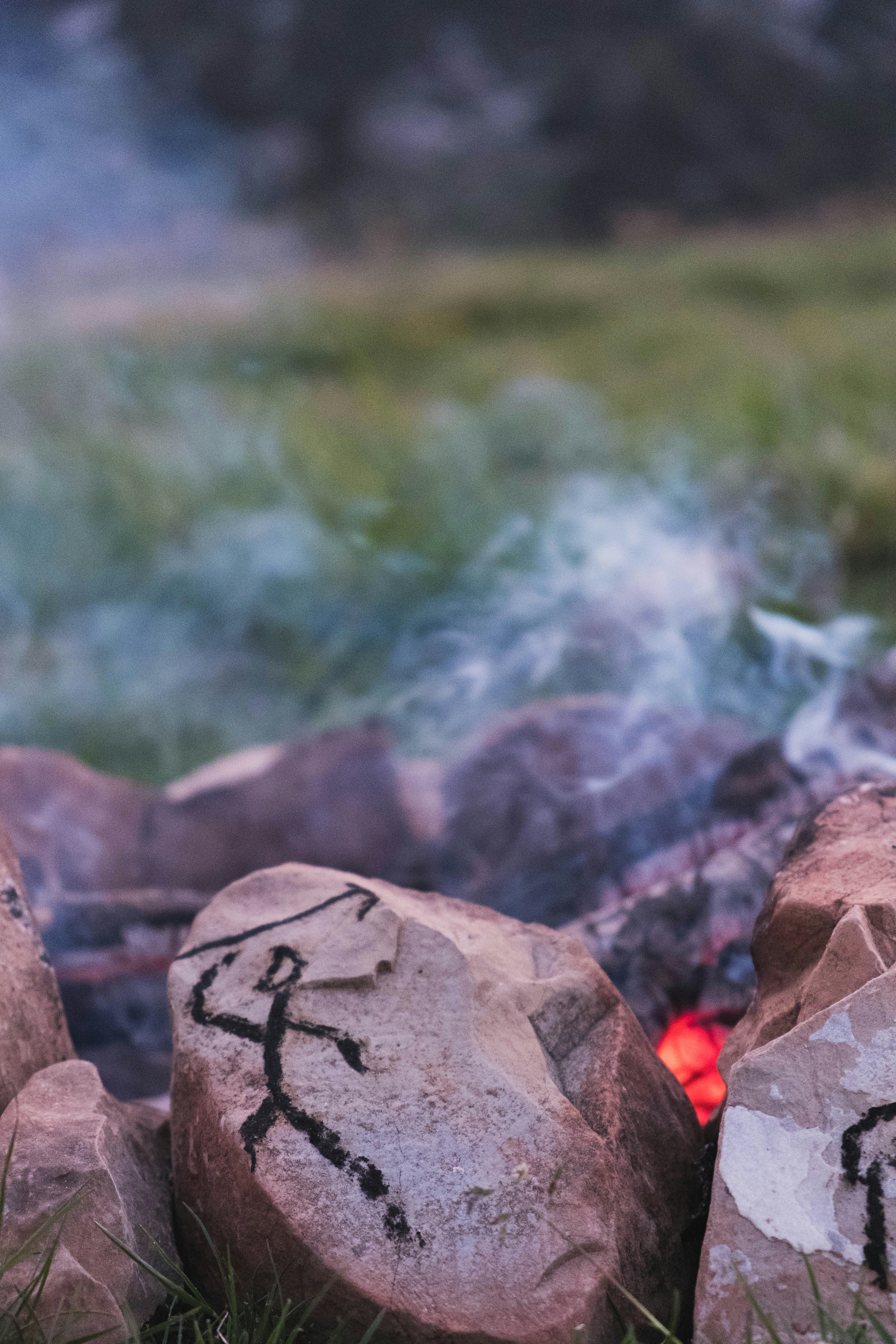 Campfire Glyphs: Stones Etch a Trekker's Path