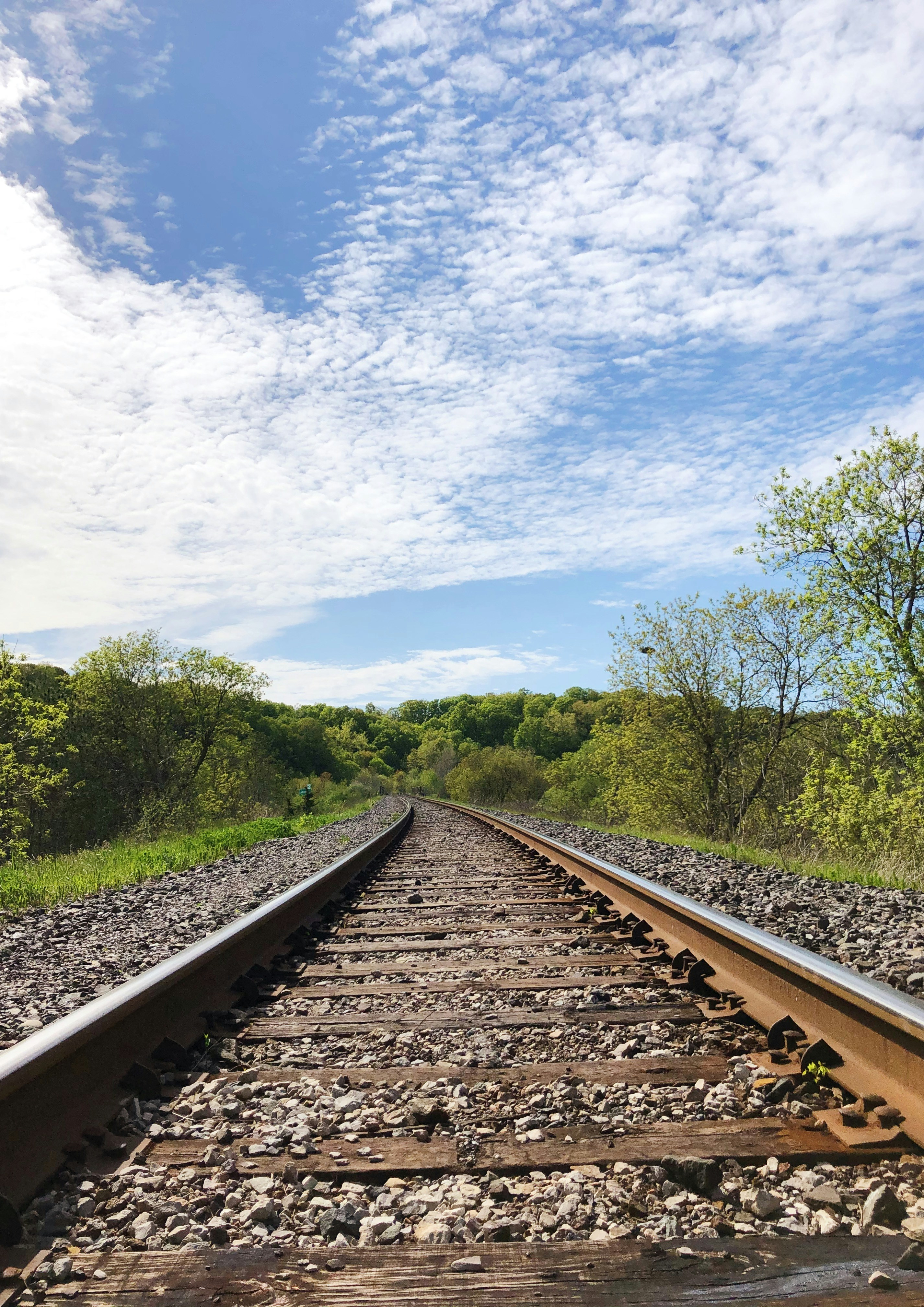 Train rail under blue sky during daytime photo – Free Blue Image on ...