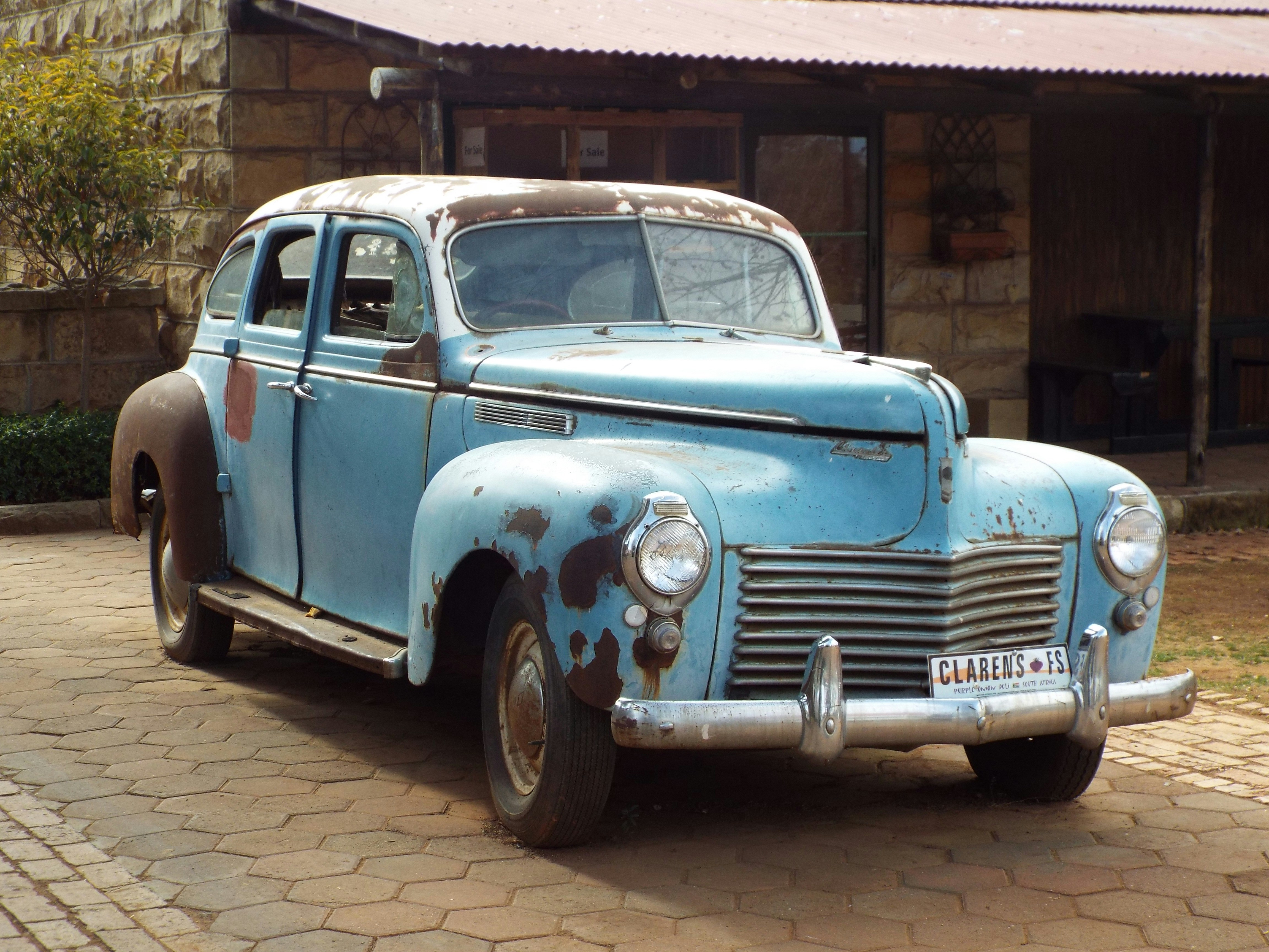 Weathered Blue Cruiser: A Quiet Drive Through Time