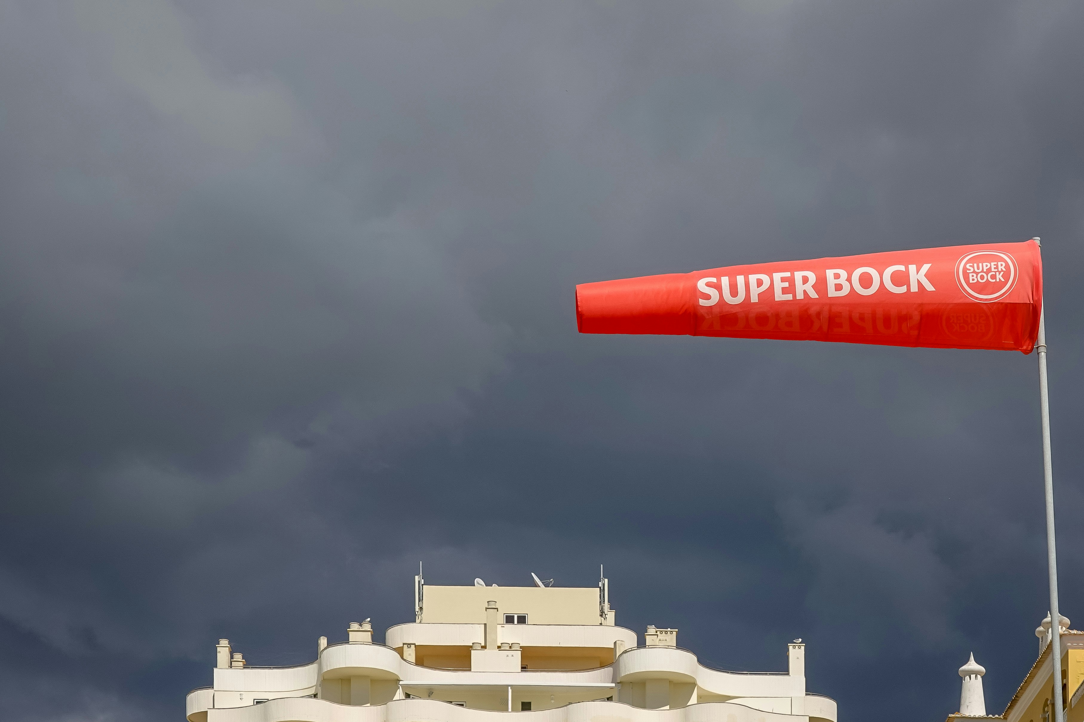 super bock: portuguese beer in stormy sky