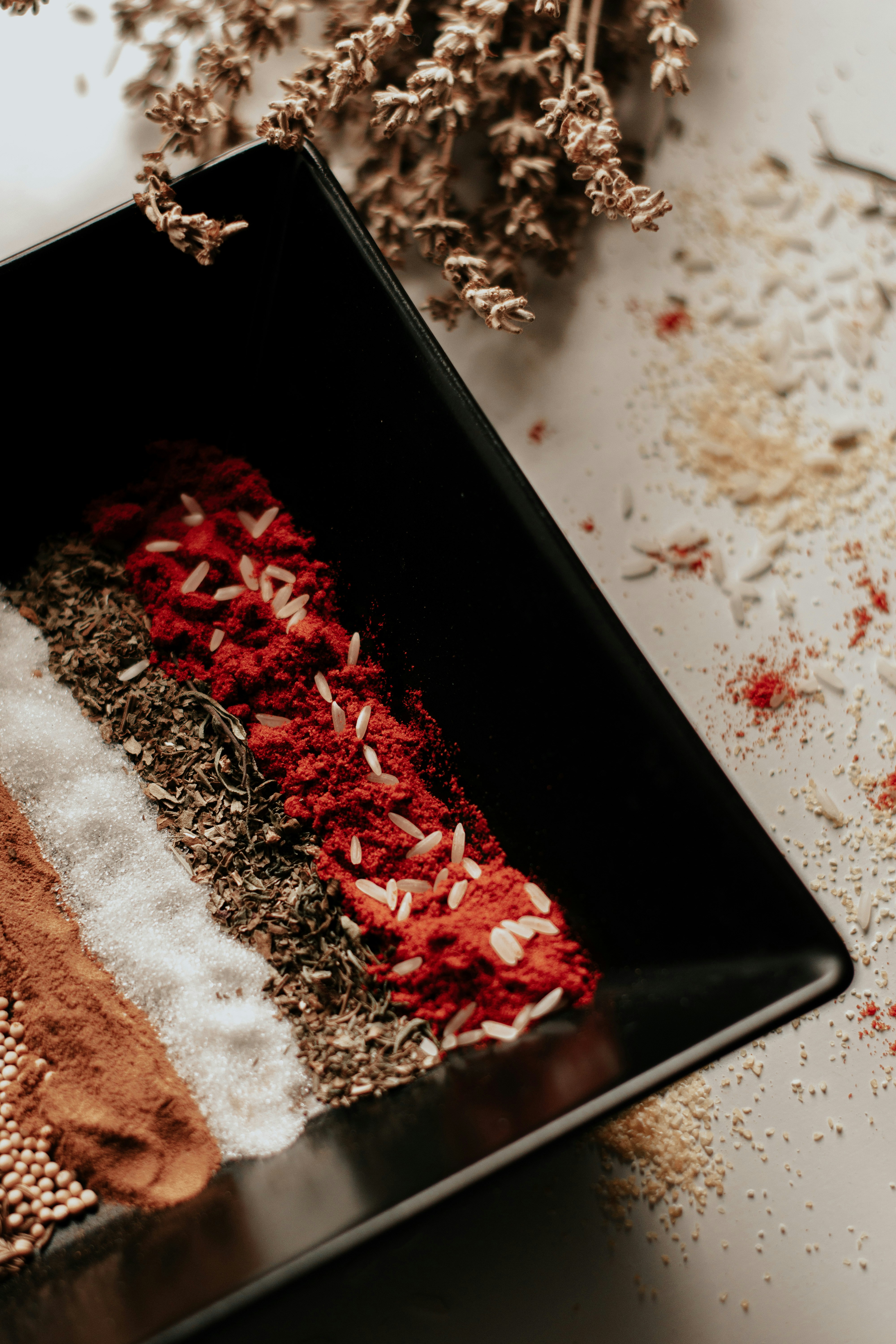 Crimson Diagonal: A Spice Palette in a Glossy Black Tray