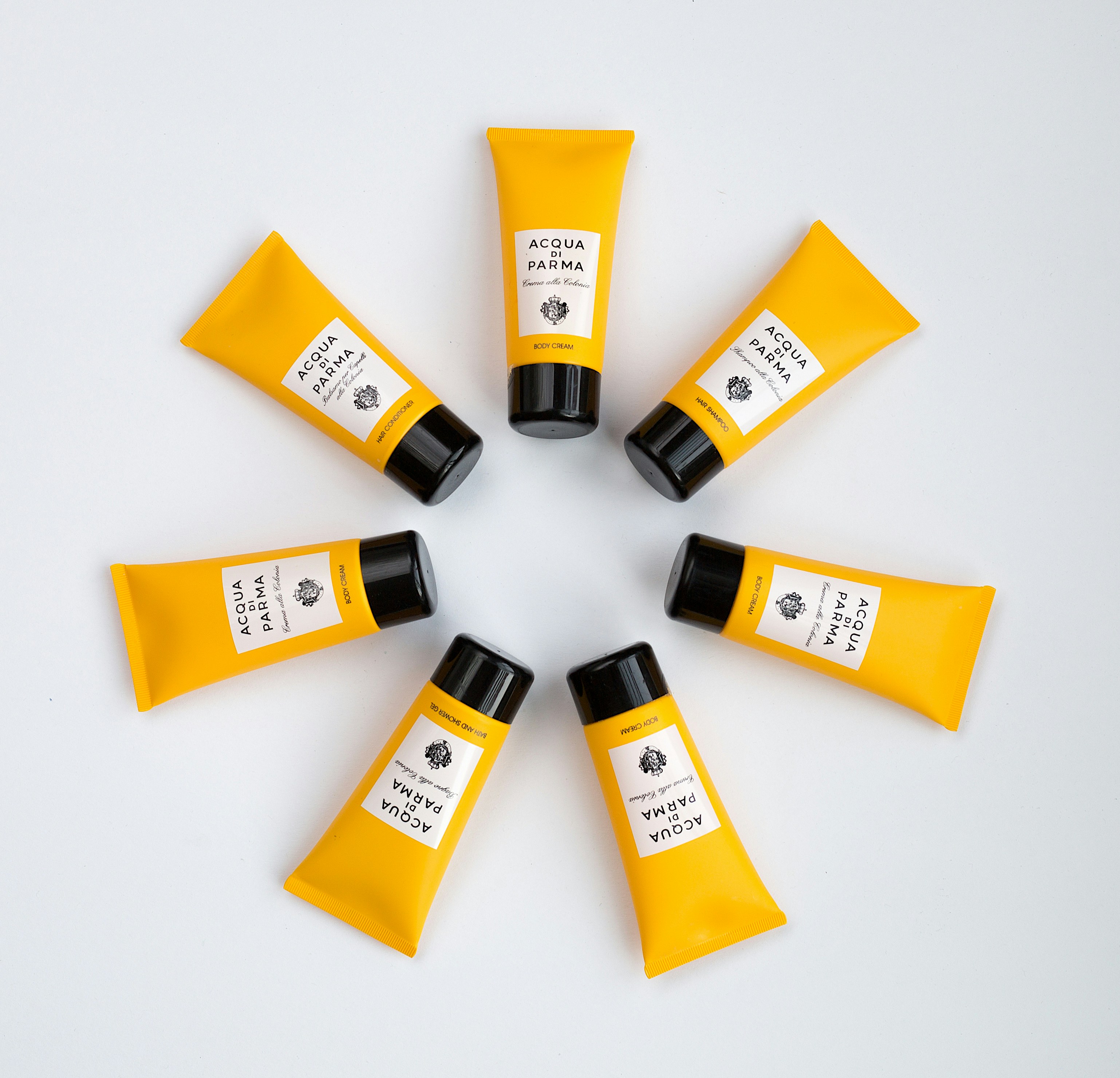 A group of five yellow tubes with black caps photo – Free Dubai ...