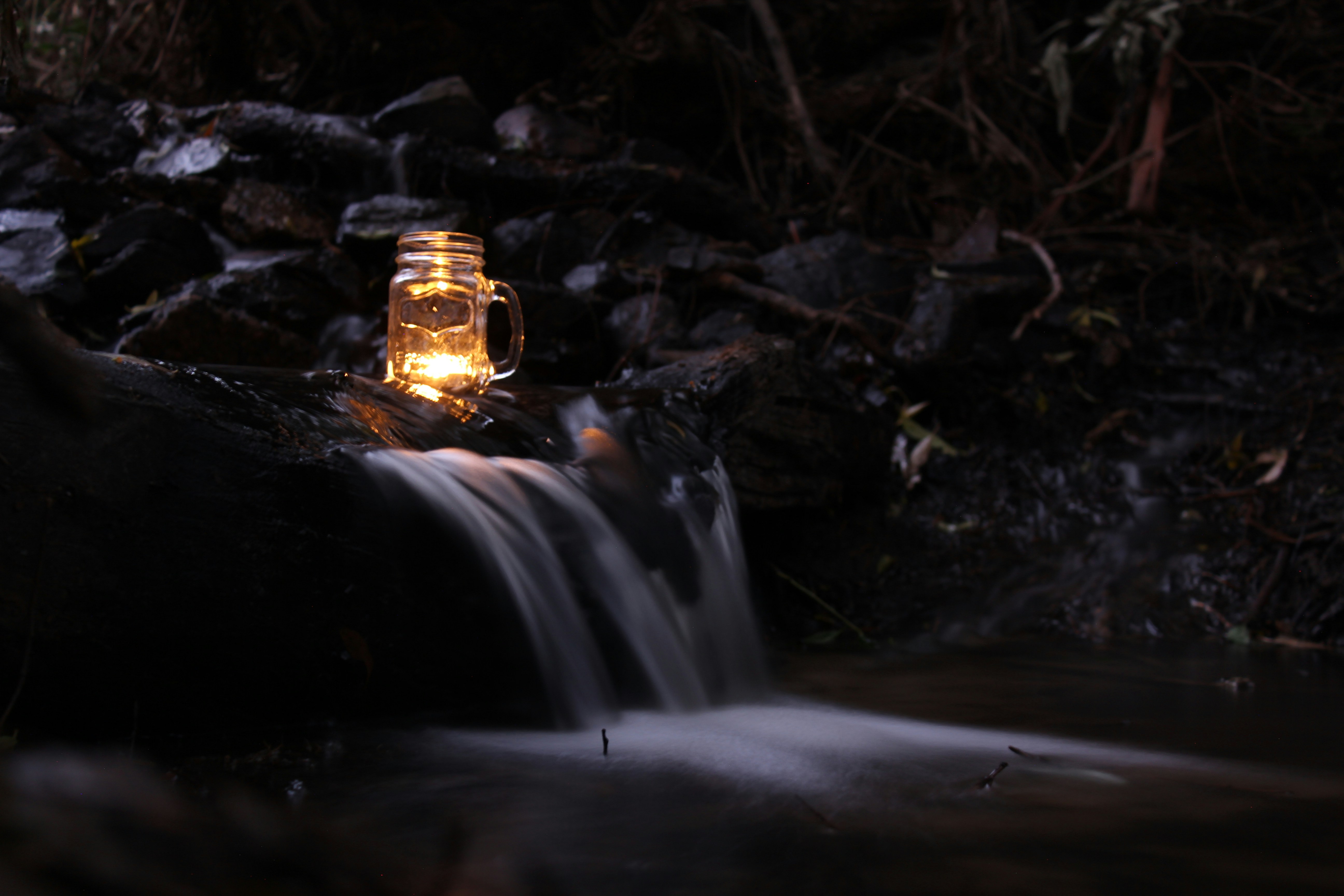 time lapse photography of water falls