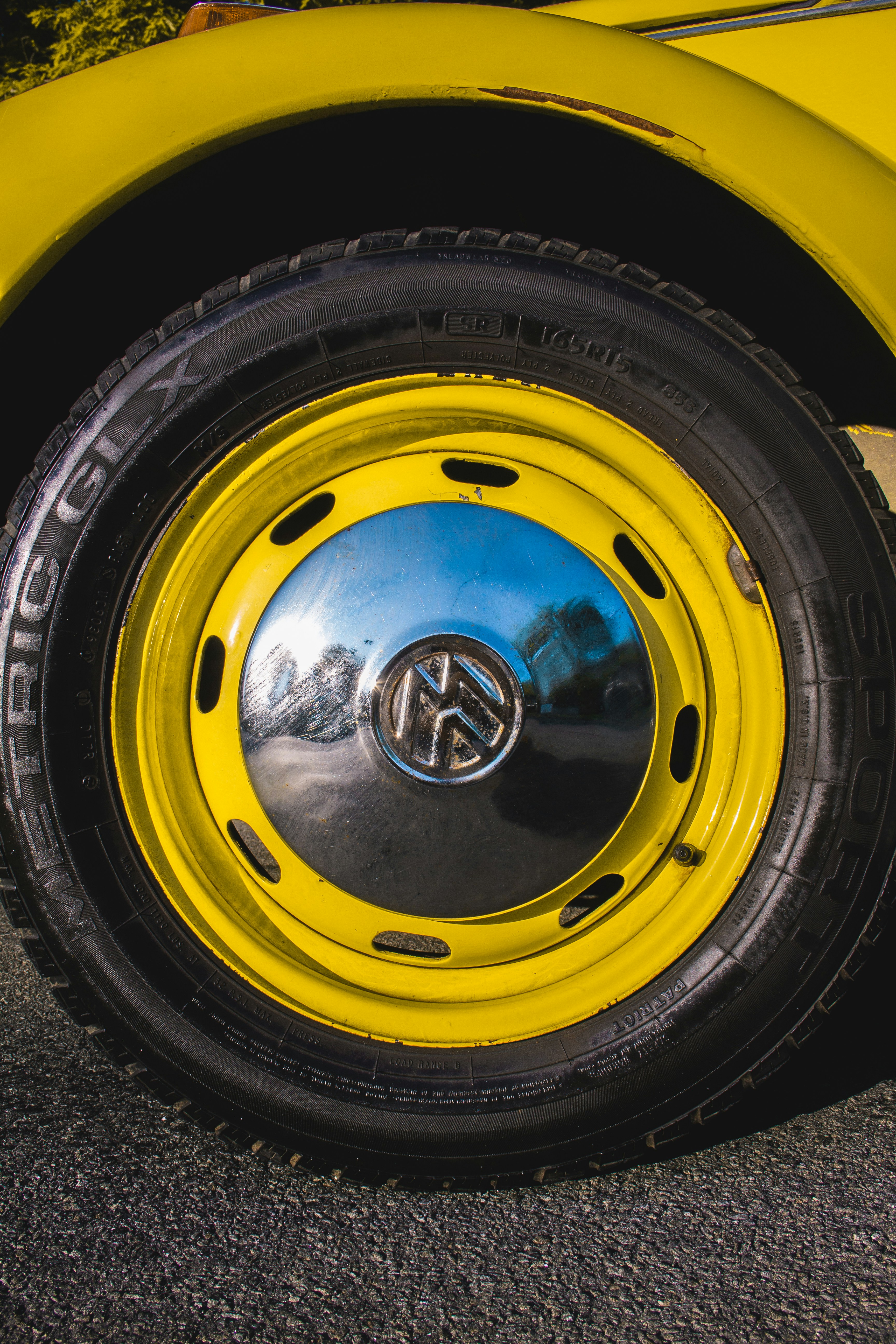 yellow and black wheel with tire