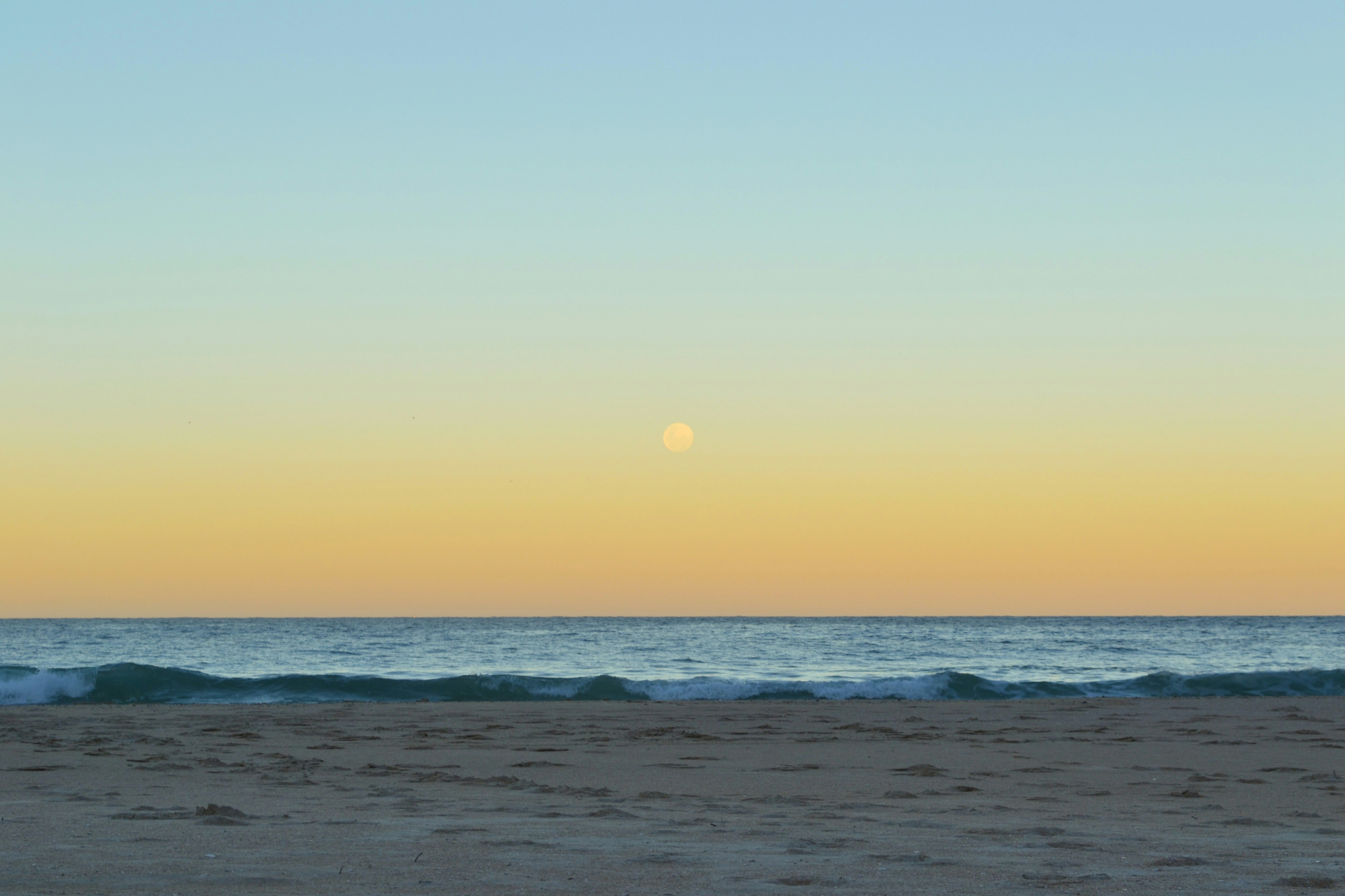 Serene Dawn Over Ocean Waves
