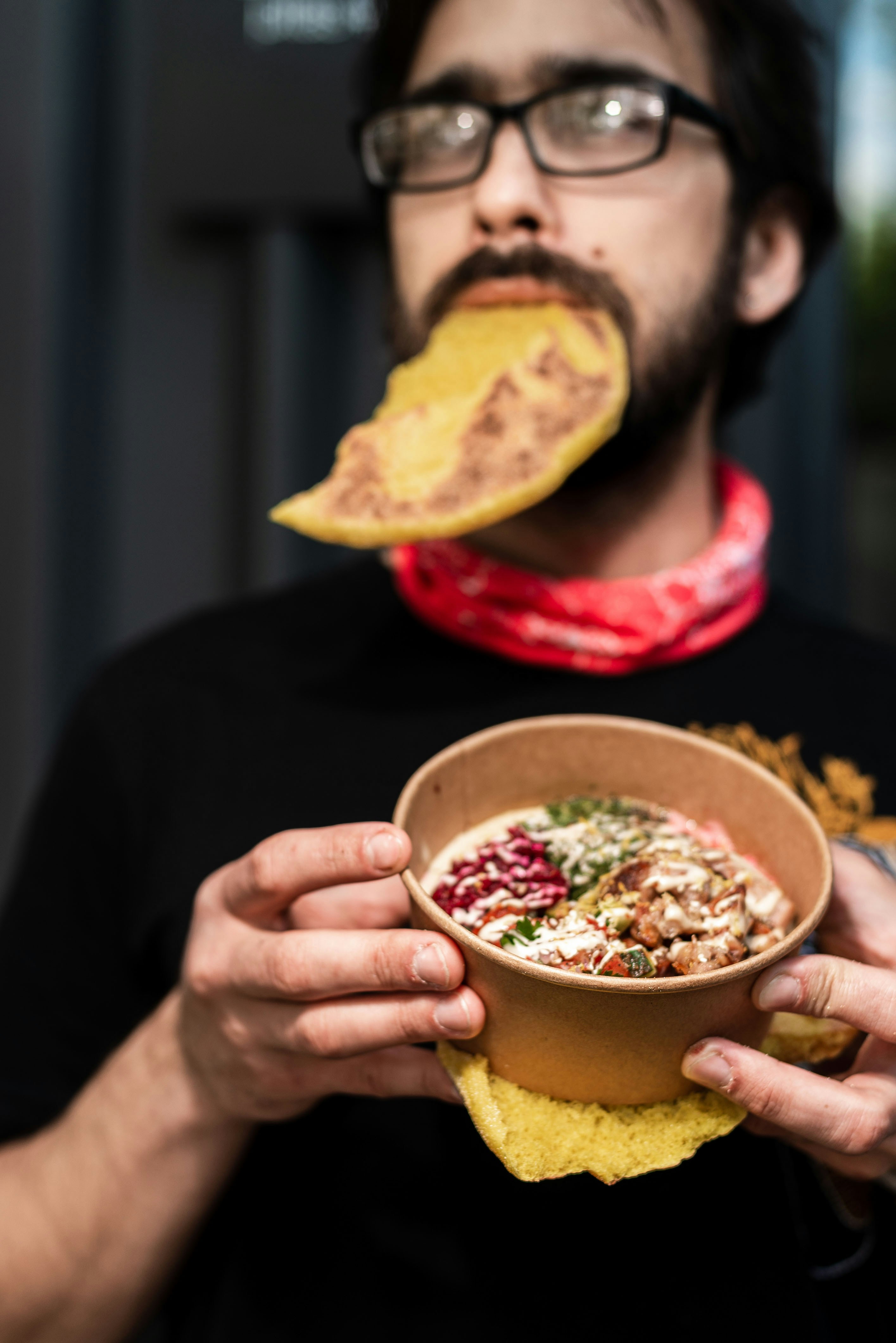 Chip in Mouth, Bowl in Hand: A Tangy Street Food Moment