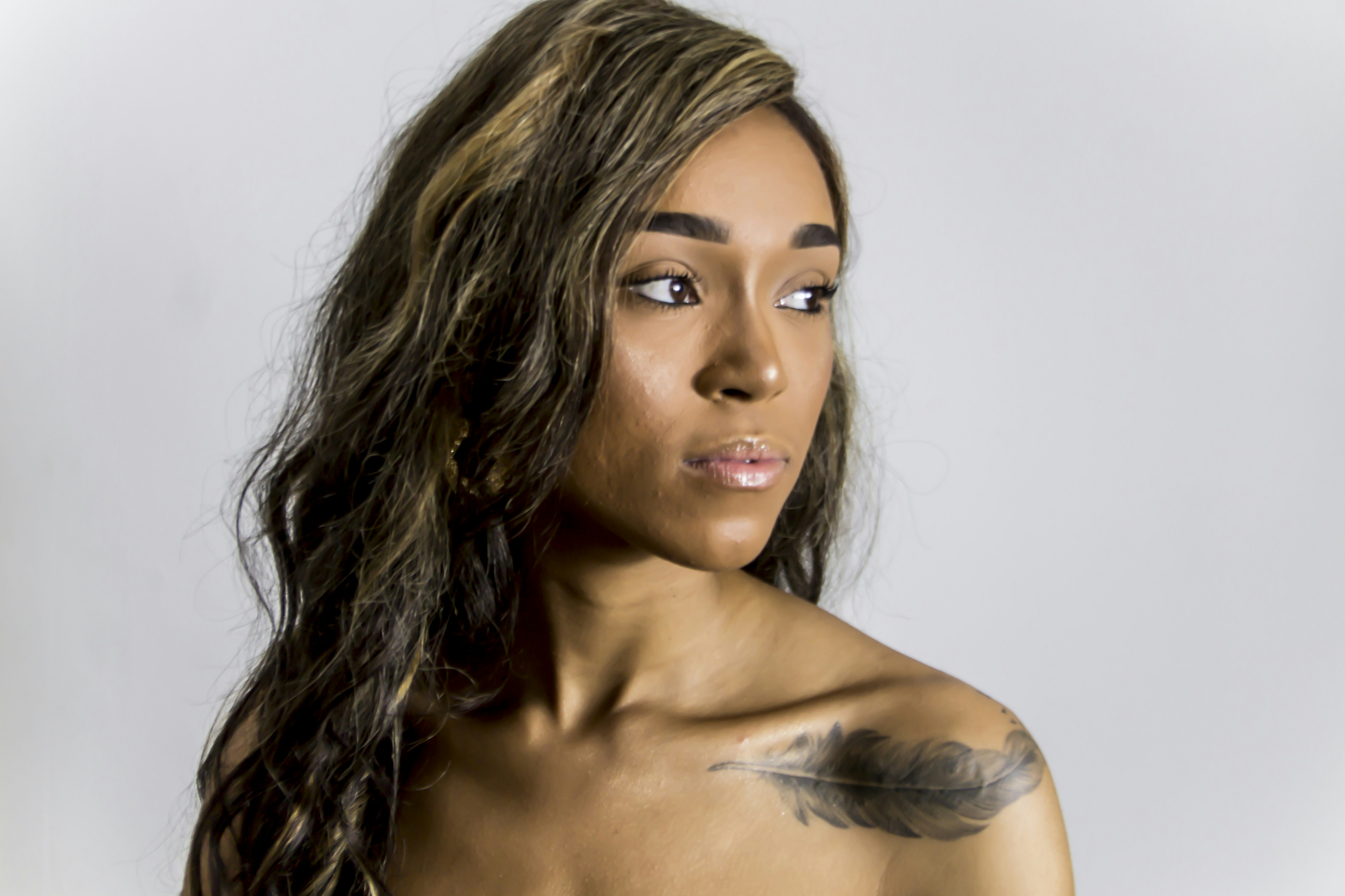 Foto zum Thema Oben ohne Frau mit braunen Haaren – Kostenloses Bild zu Angola auf Unsplash