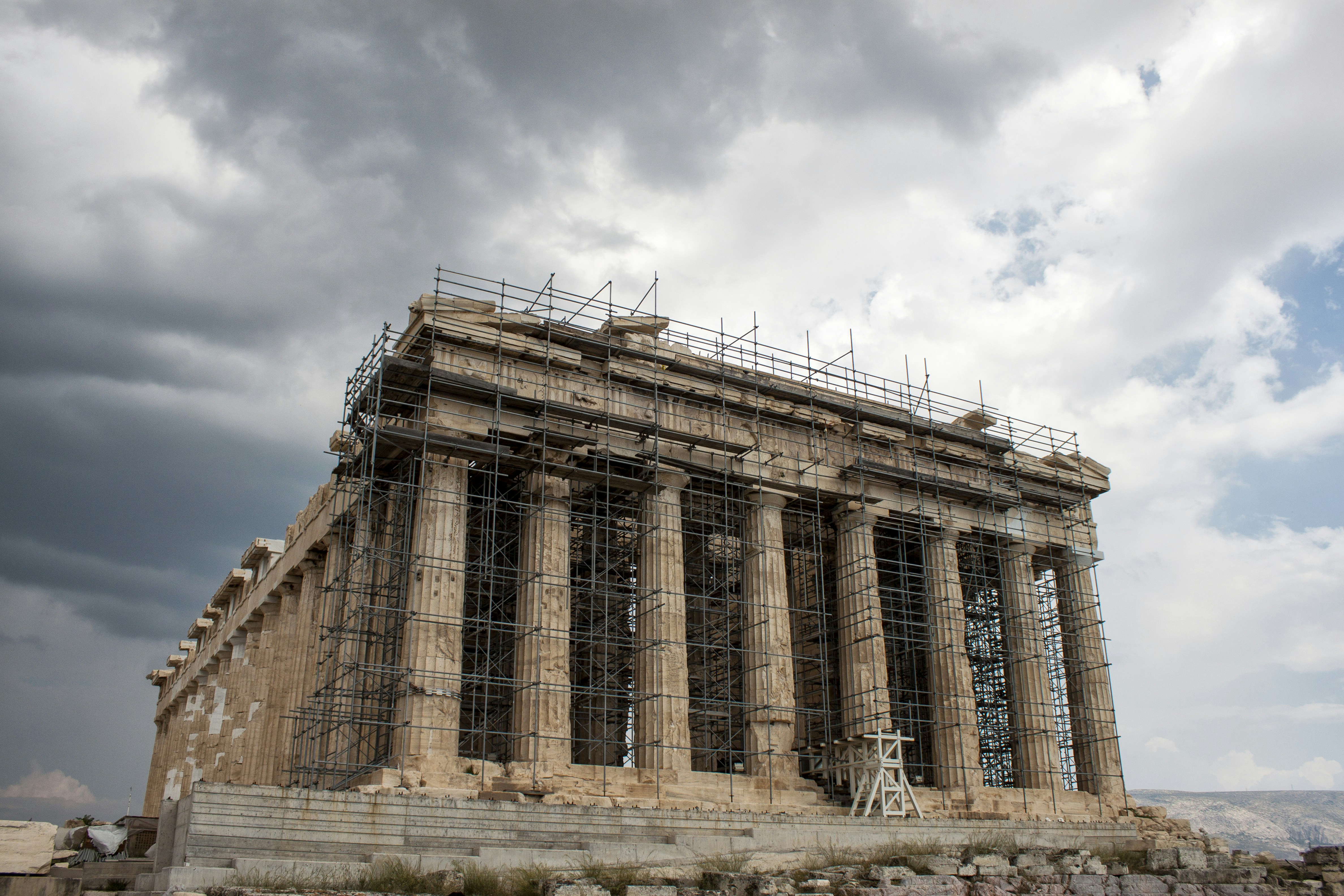 Under Renovation: The Parthenon in Scaffolding Against a Stormy Sky