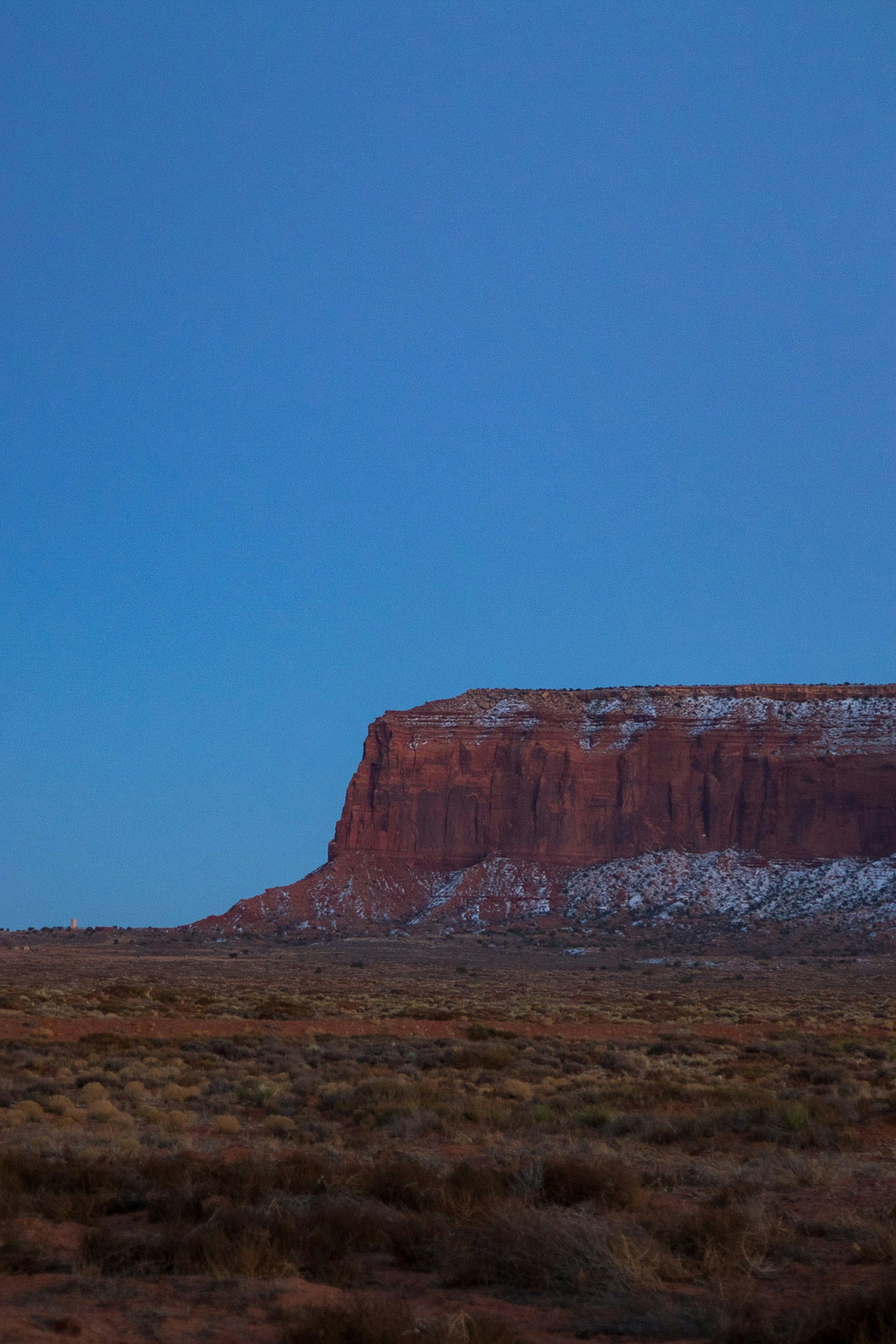 Desert Plateau under a Quiet Blue Sky