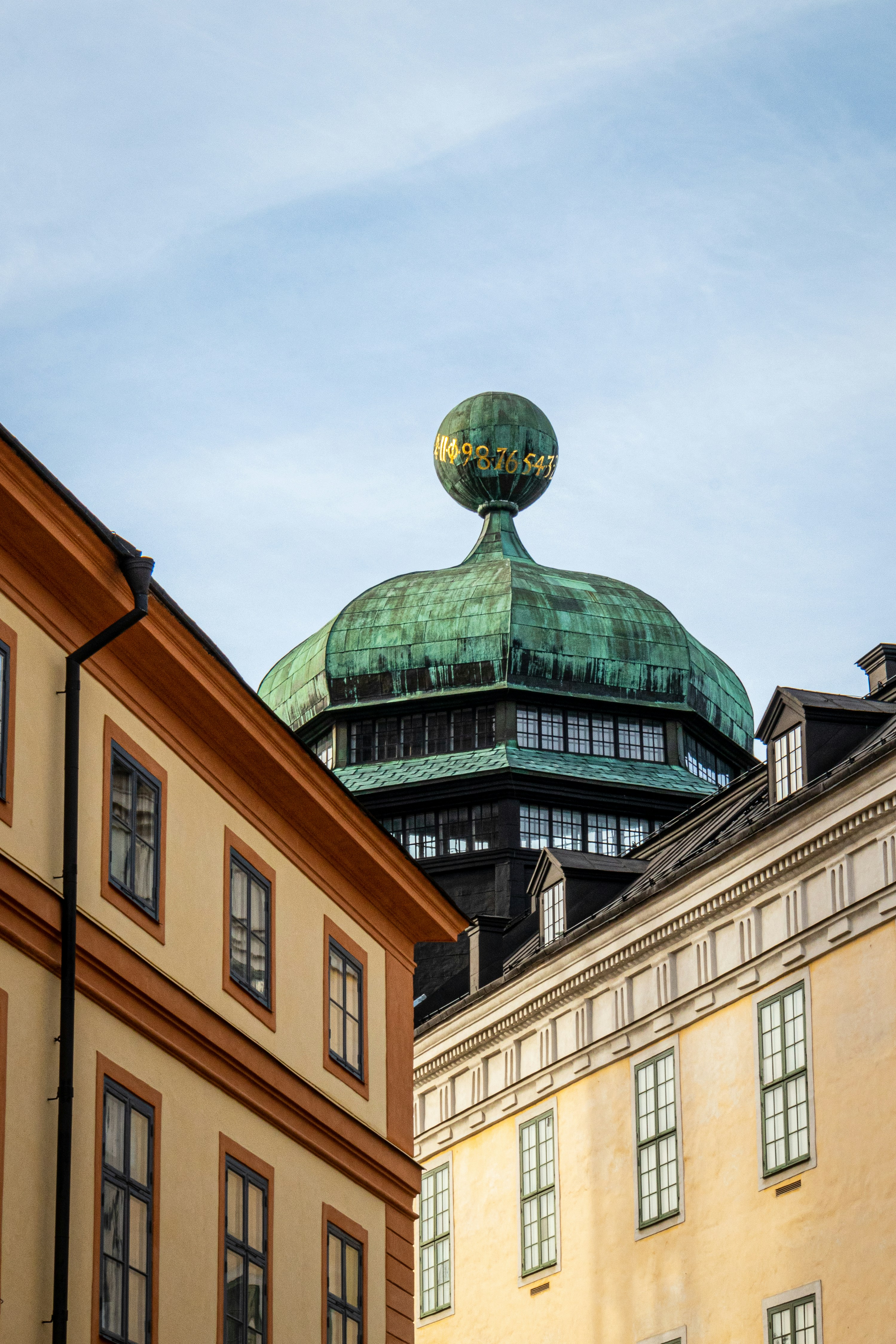 Green and brown dome building under cloudy sky during daytime photo ...