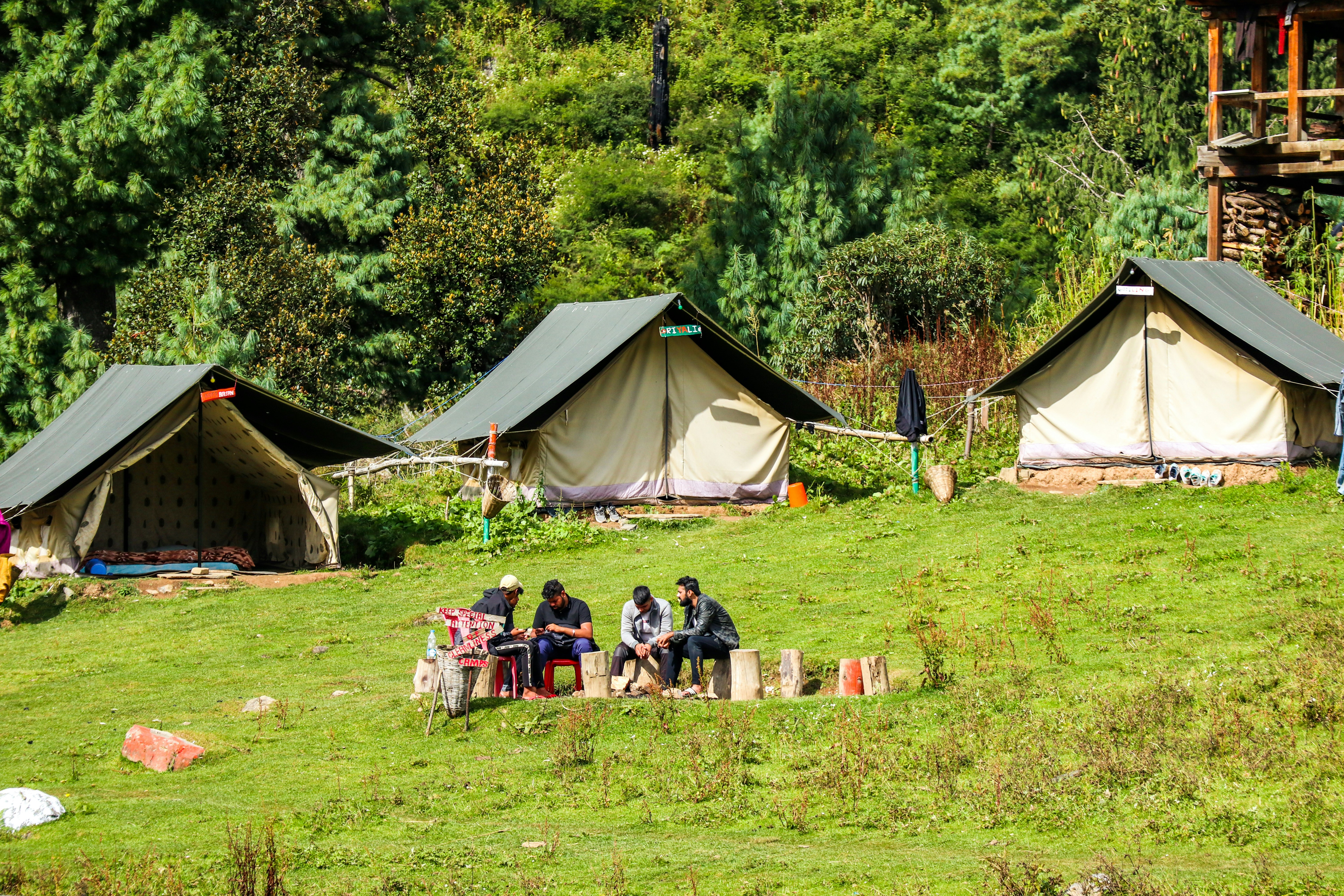 People sitting on camping chairs near tent during daytime photo – Free ...