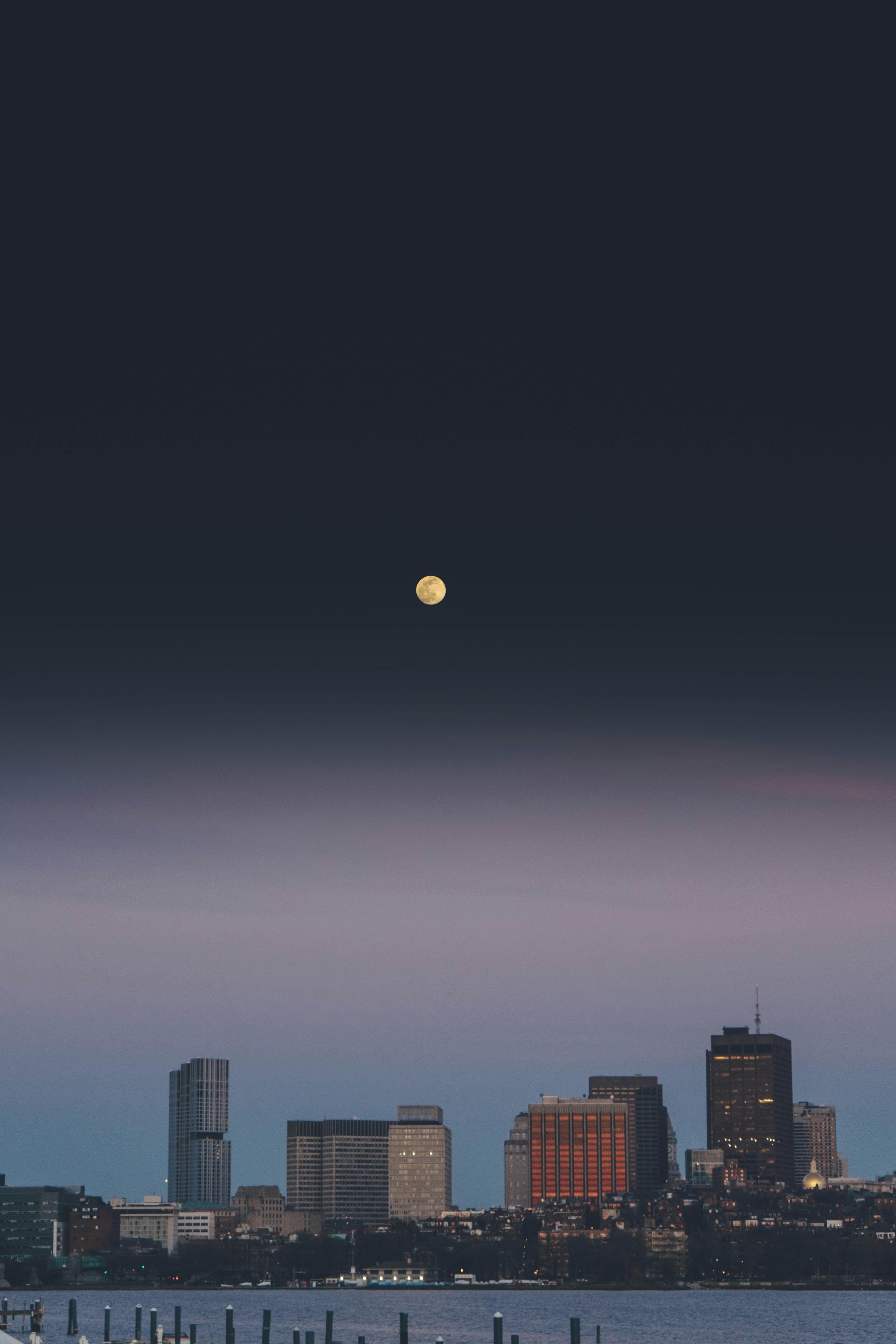 Full moon over city buildings photo – Free Moon Image on Unsplash