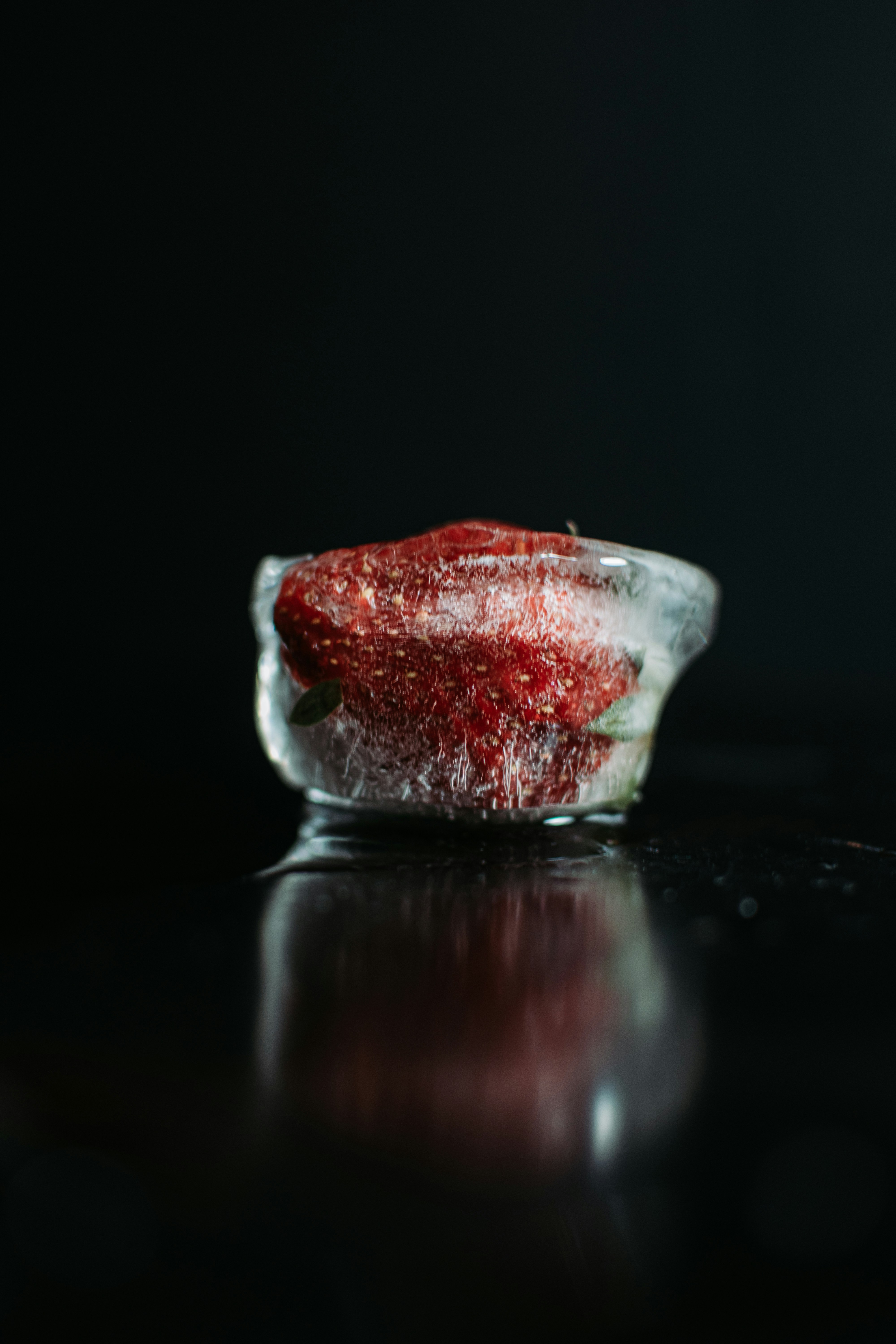 Strawberry Prism: A Frozen Capsule on a Midnight Surface