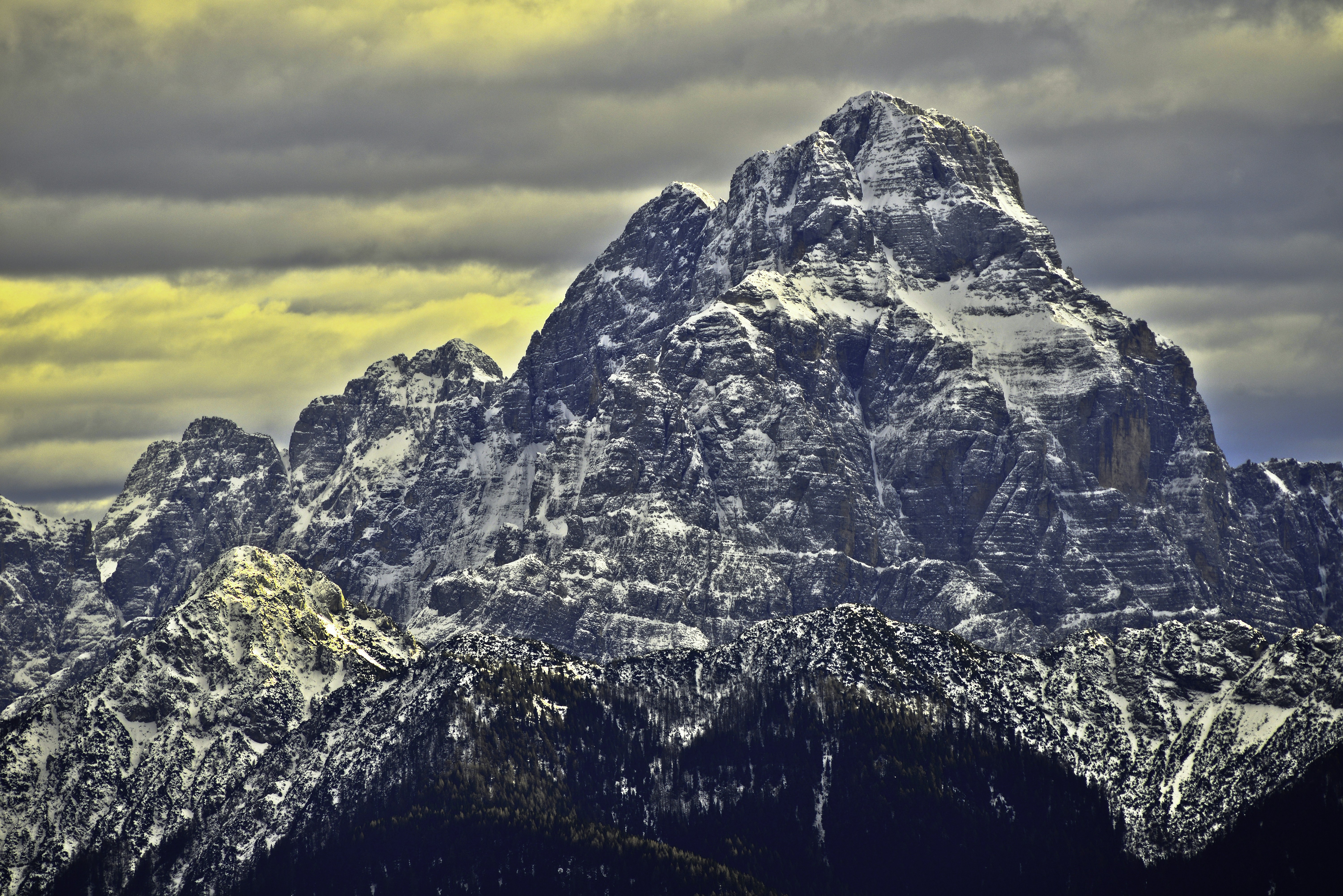 Majestic Peaks Under a Moody Sky