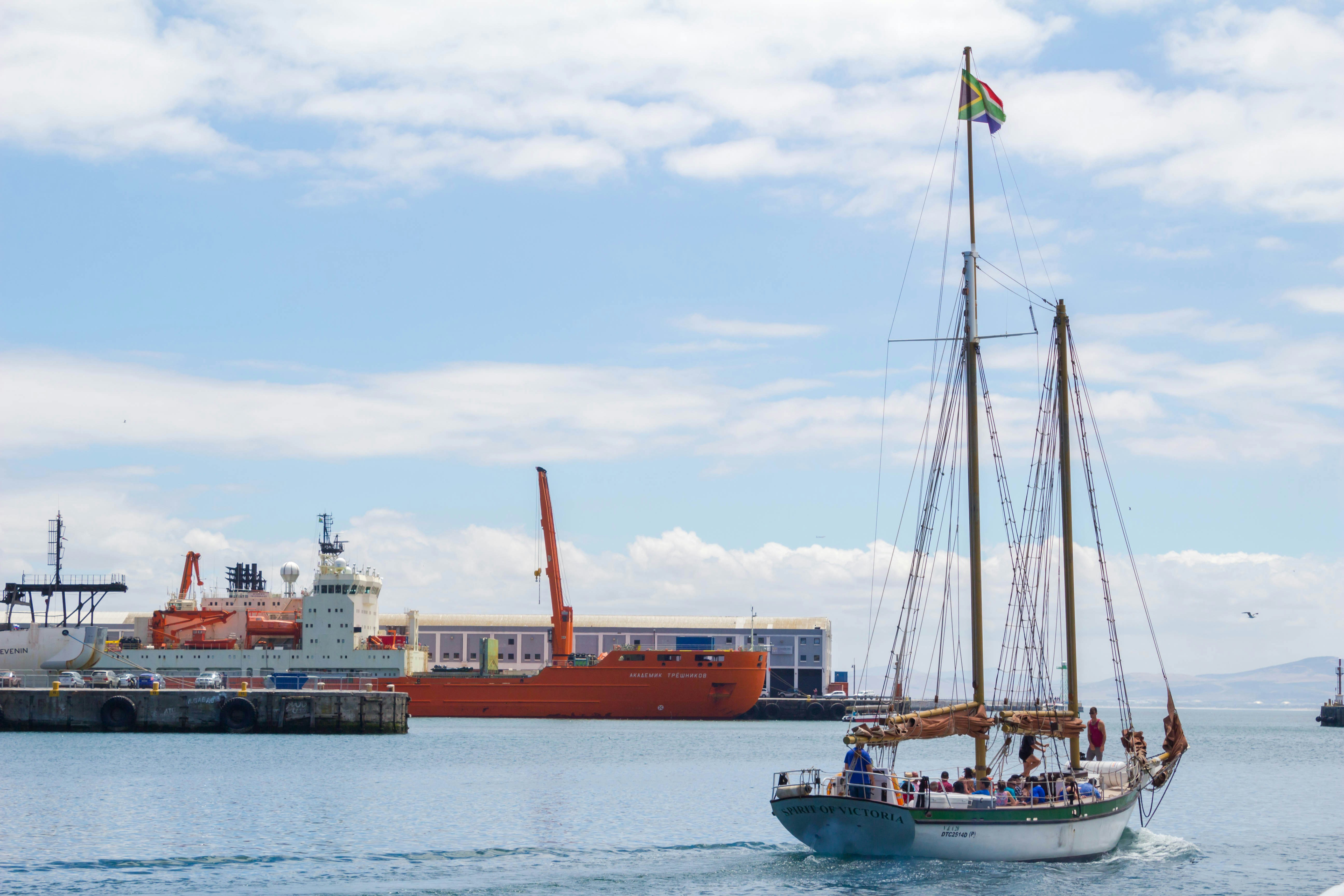 Blue and red ship on sea during daytime photo – Free Cape town Image on ...
