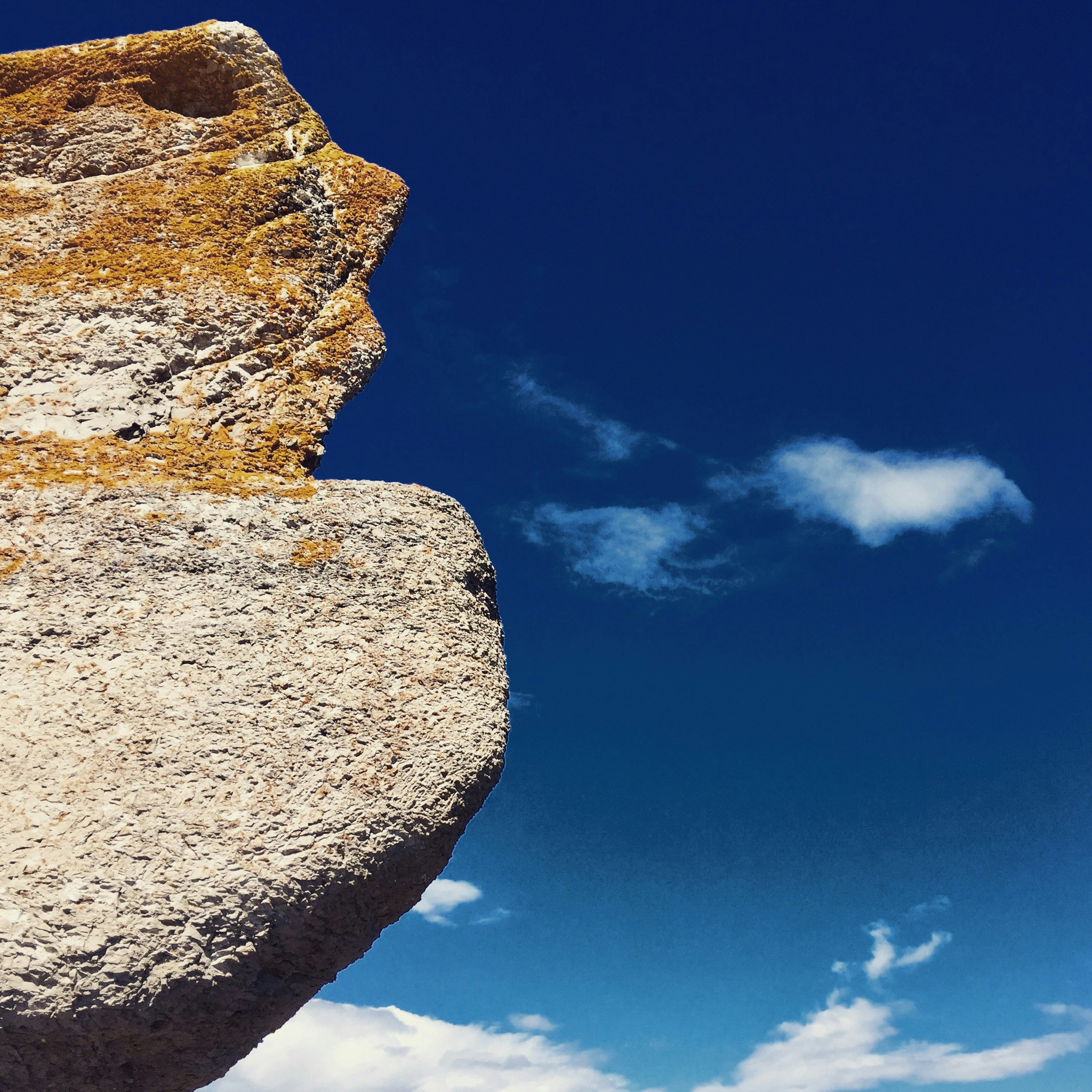 Desert Parapet: A Ledge of Cliff Against a Velvet Sky