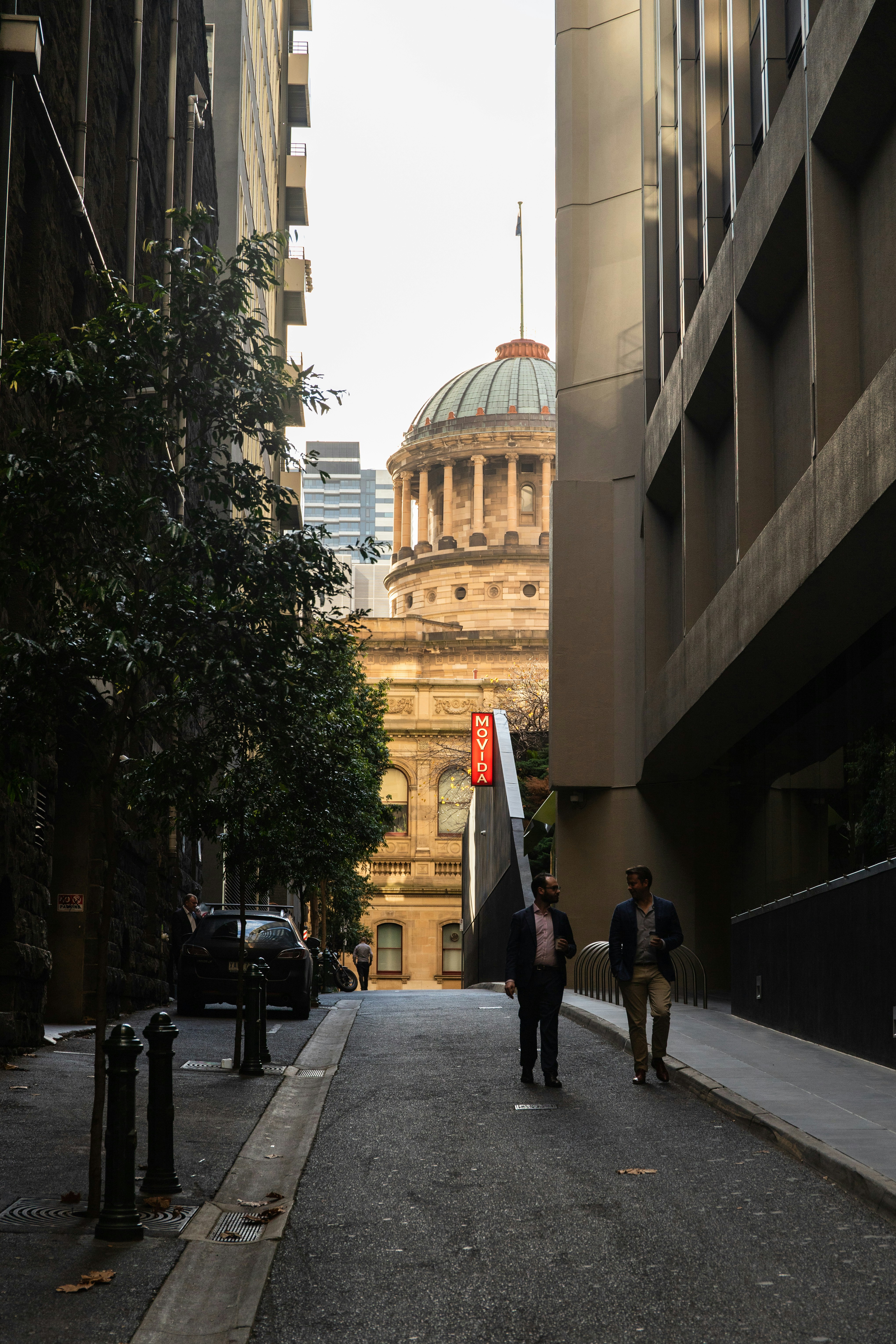Distant Dome Amid City Walk
