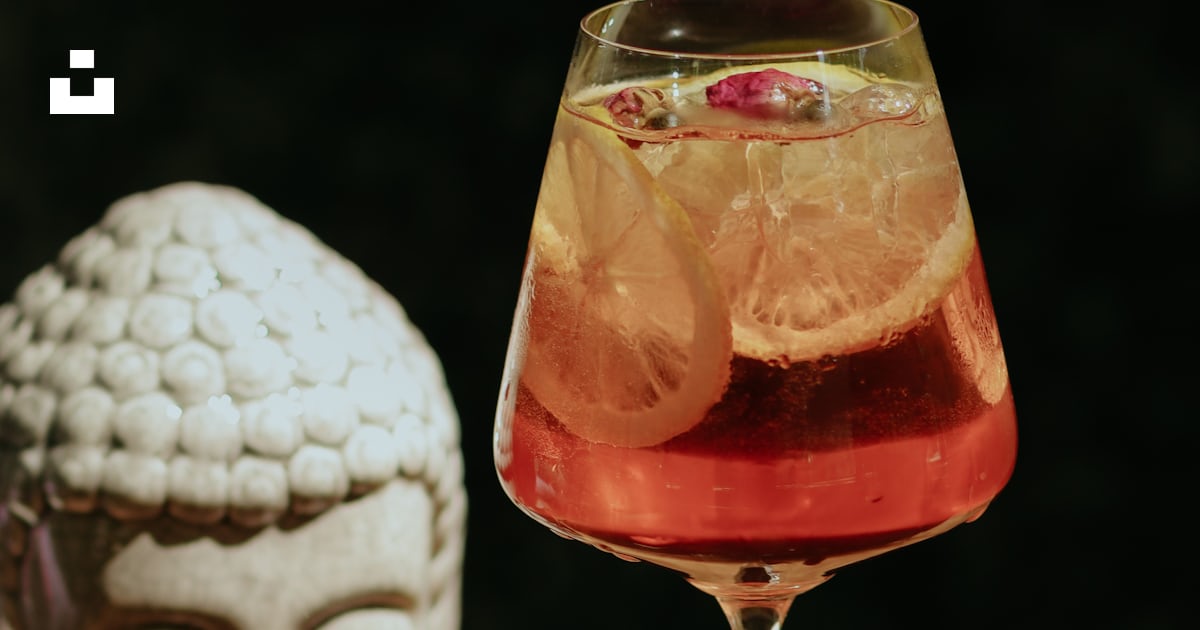 Clear Wine Glass With Red Liquid Inside Photo Free Alcohol Image On Unsplash