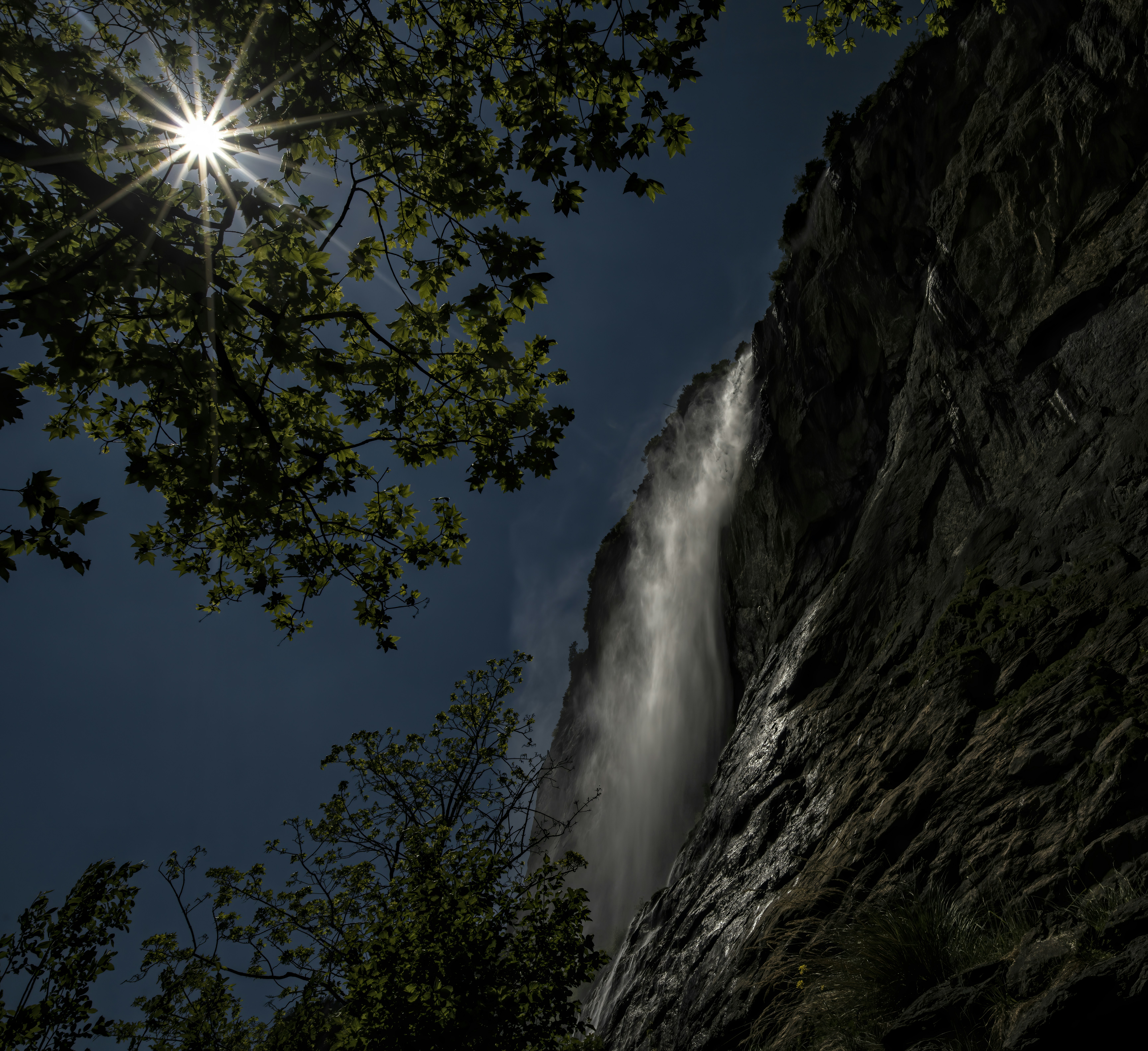 Low angle photography of waterfalls under blue sky during daytime photo ...