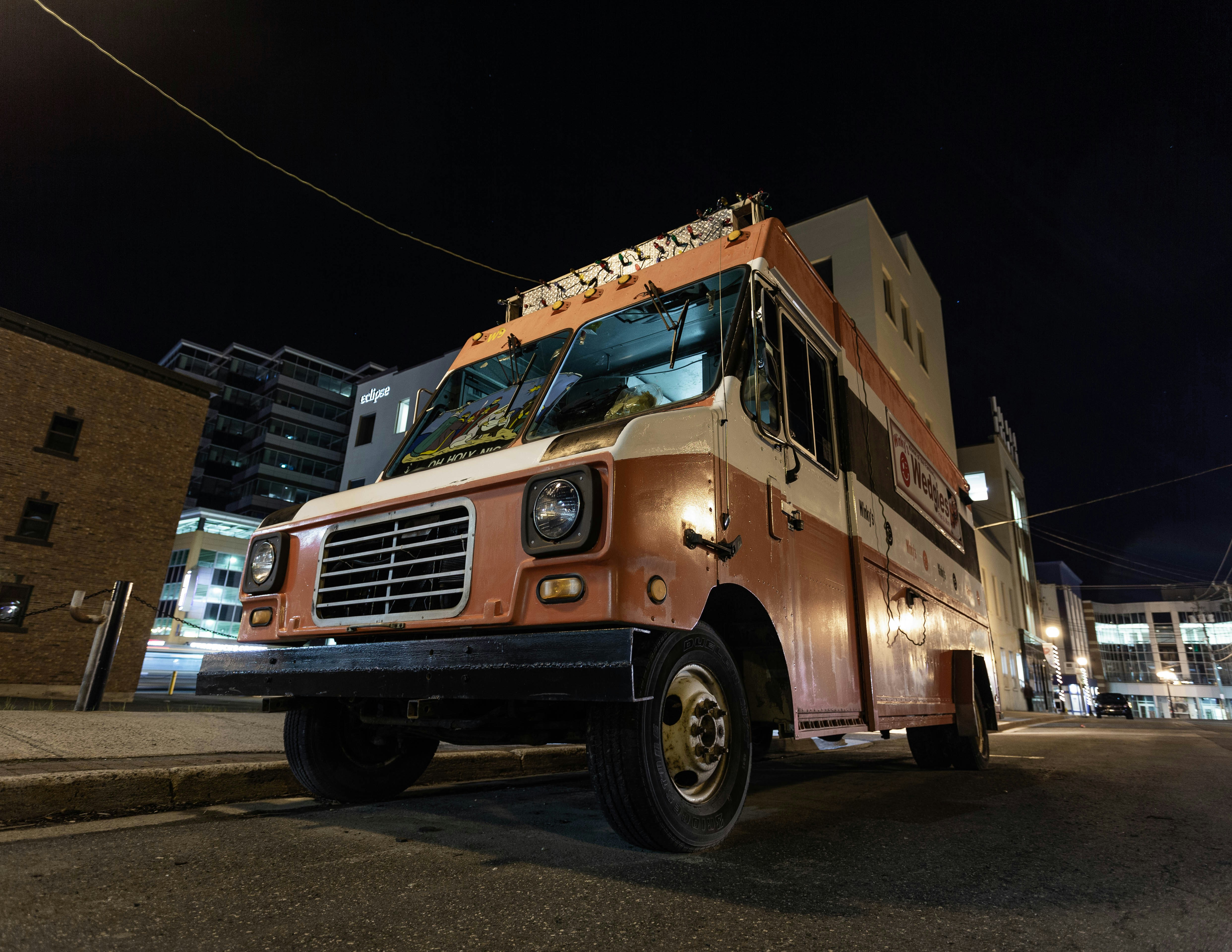 Night-Glow: A Retro Food Truck Anchored on a Quiet City Street