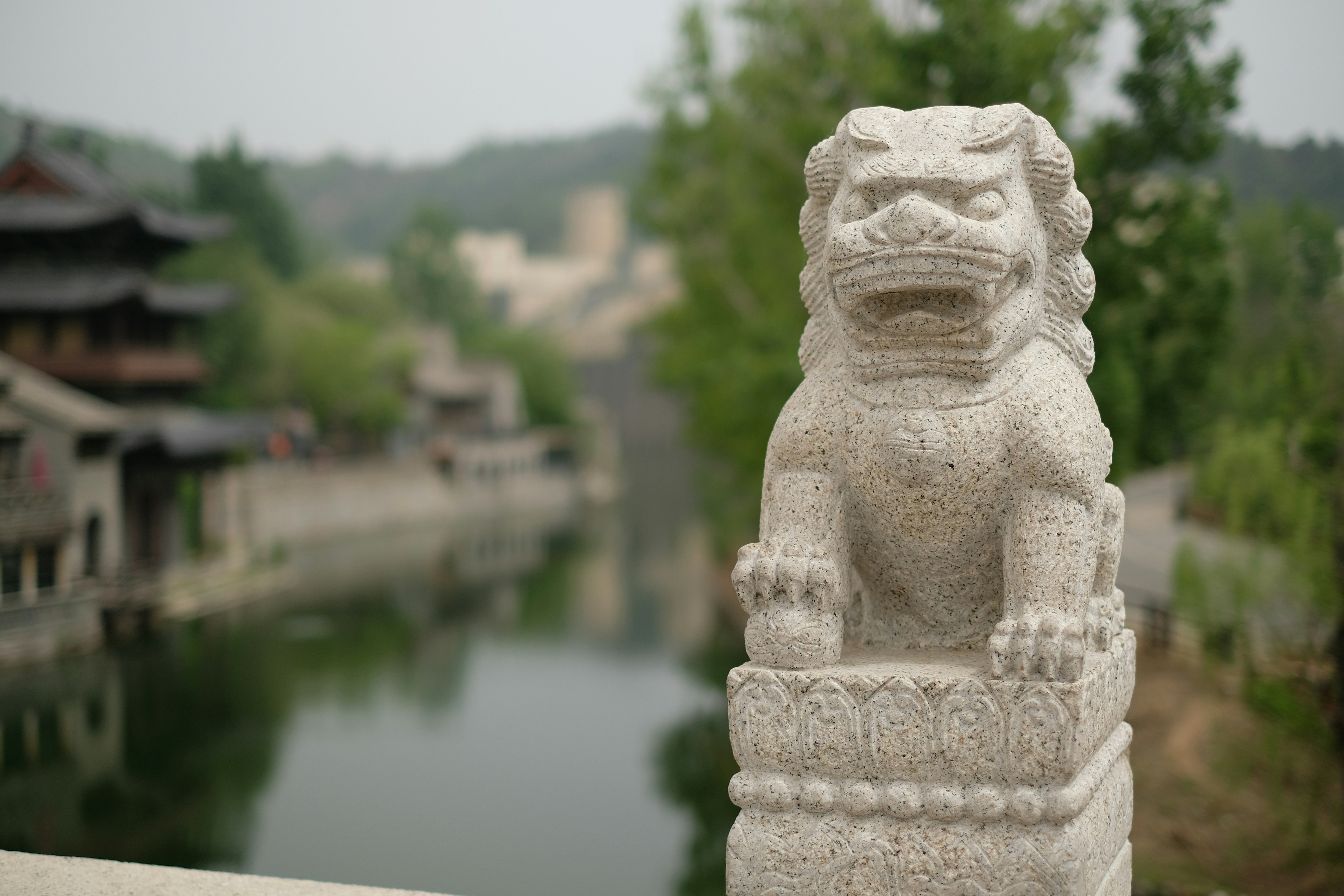 White concrete statue near body of water during daytime photo – Free ...
