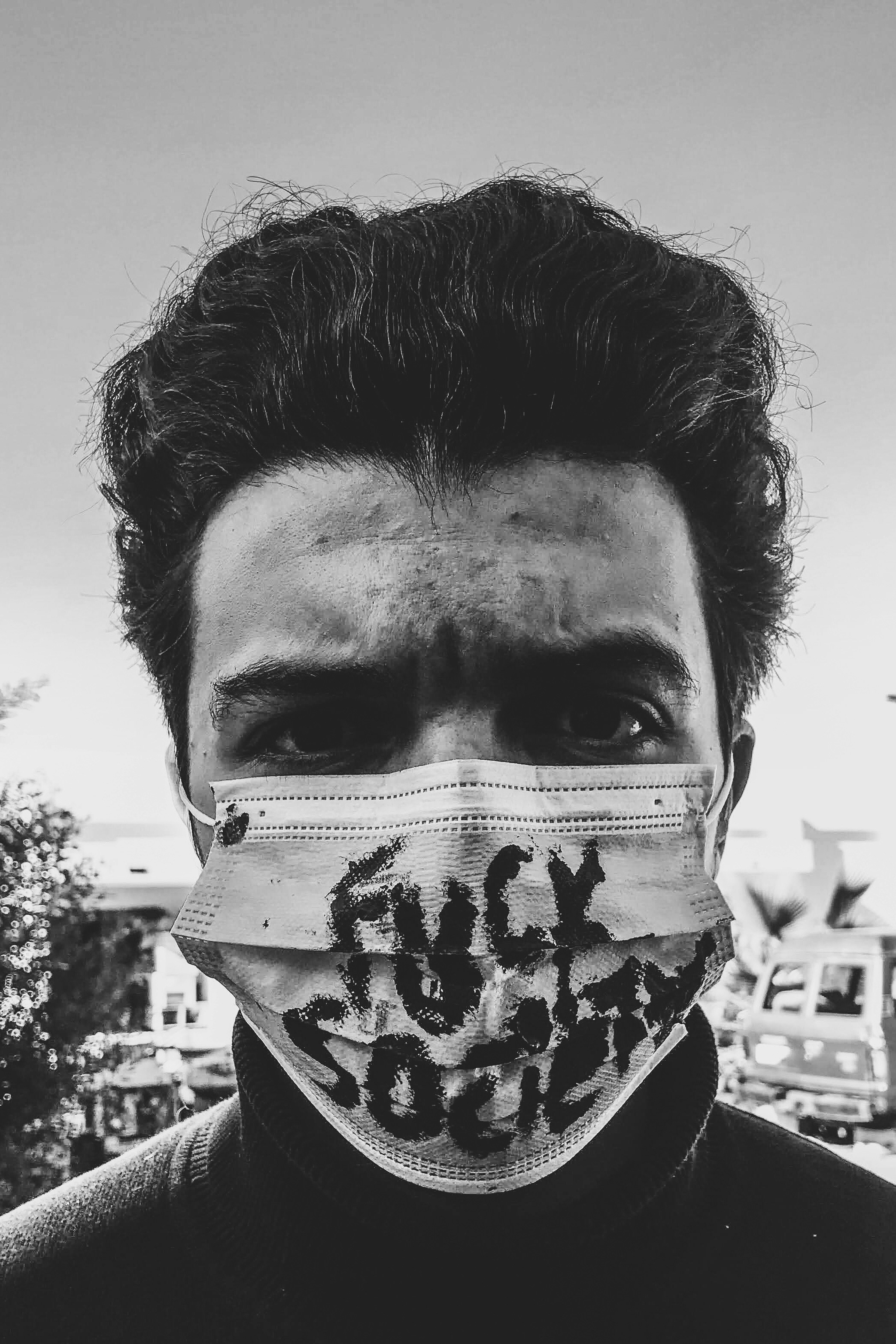 Grayscale photo of man with face paint photo – Free Grey Image on Unsplash