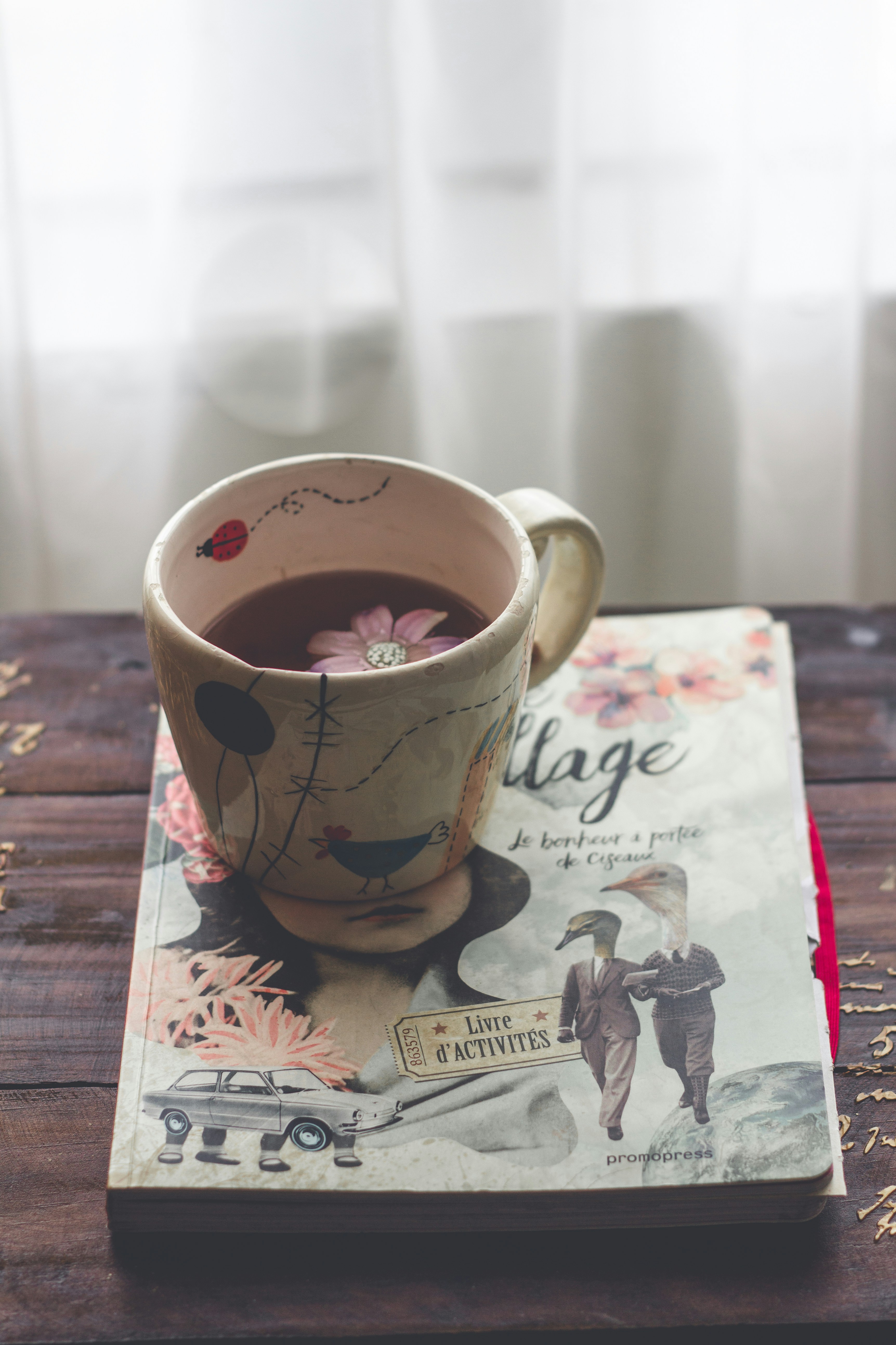 Cup of Quiet Moments on a Magazine-Top Still Life