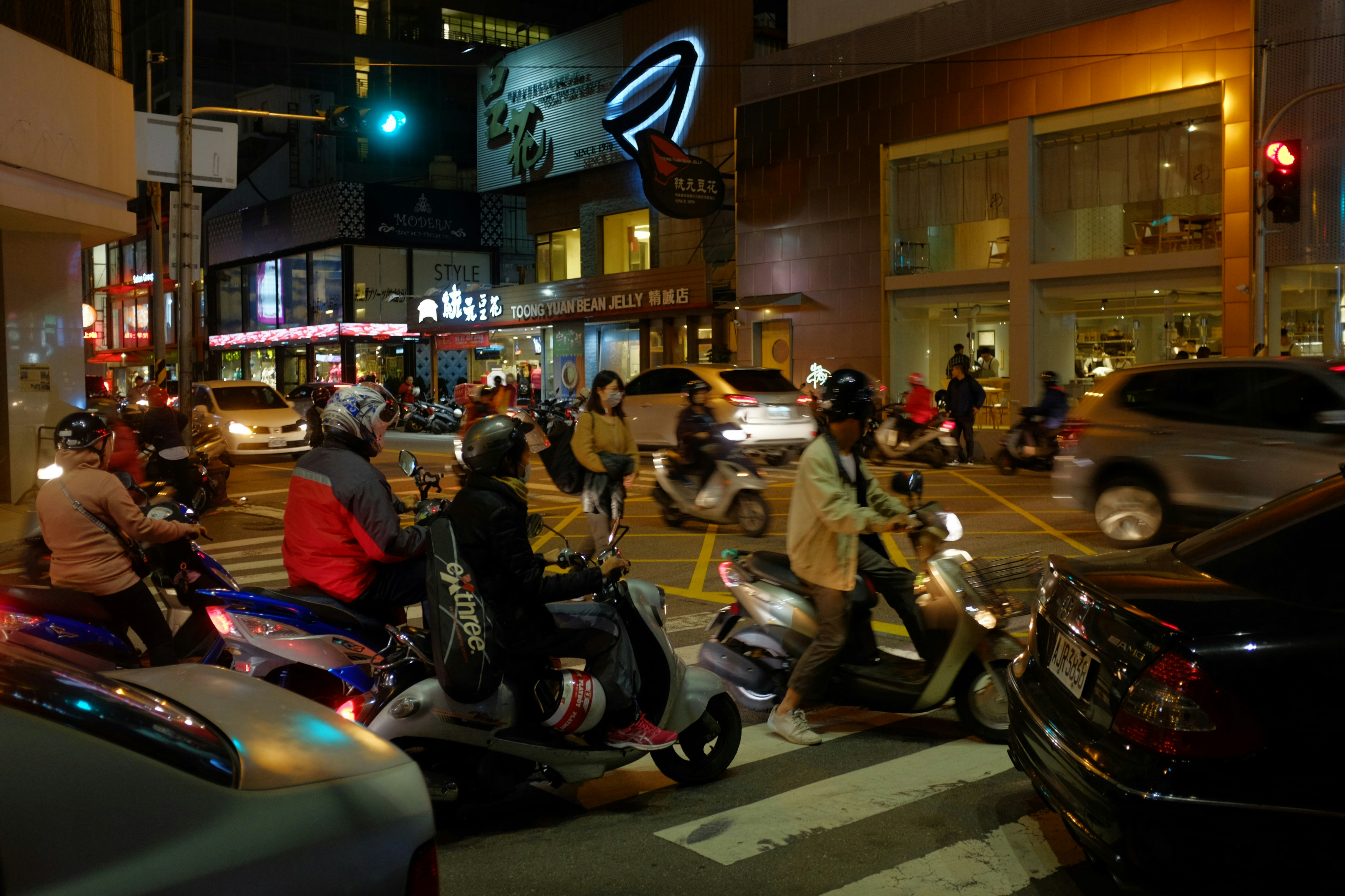 people riding motorcycle on road during night time