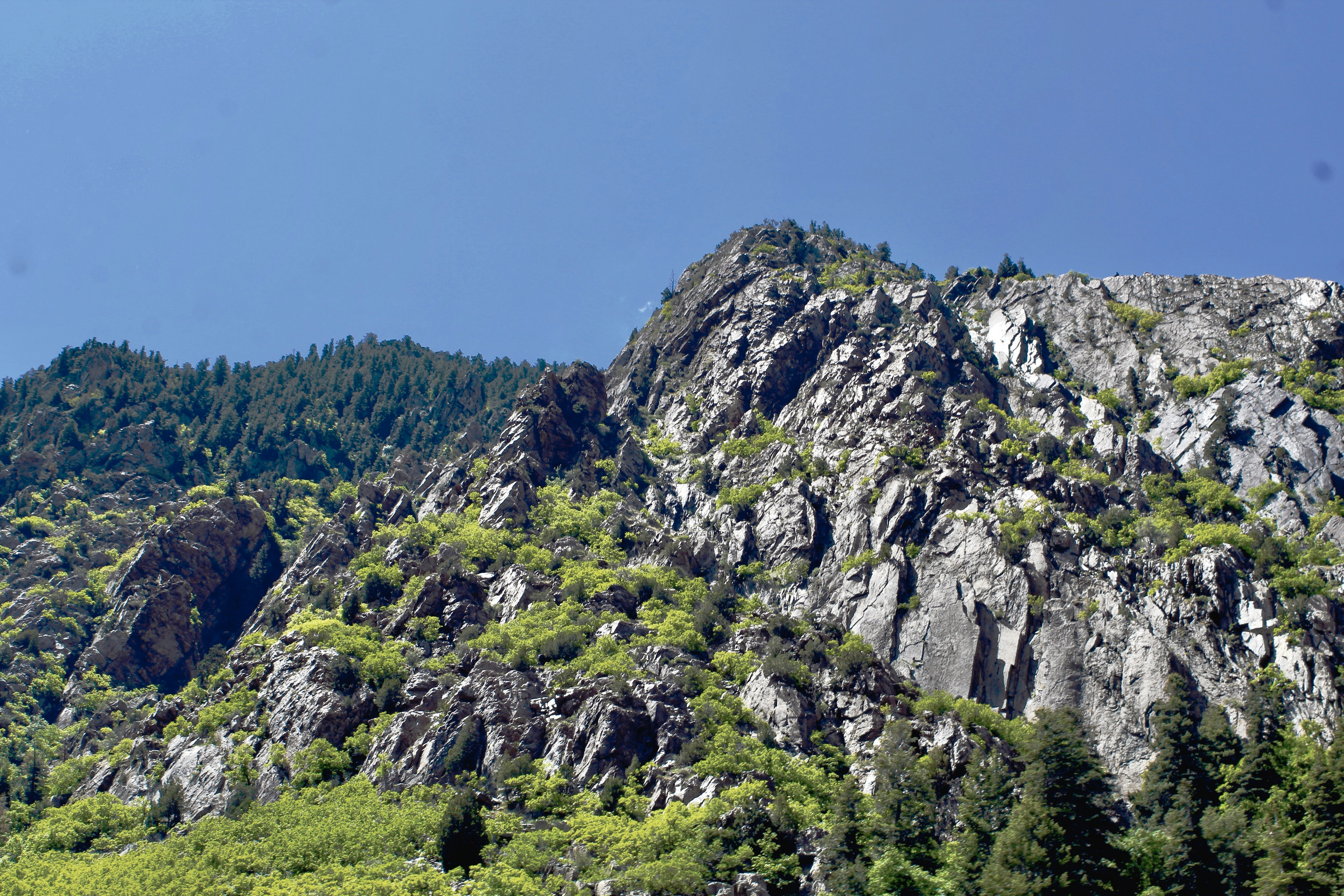 Gray rocky mountain under blue sky during daytime photo – Free United ...
