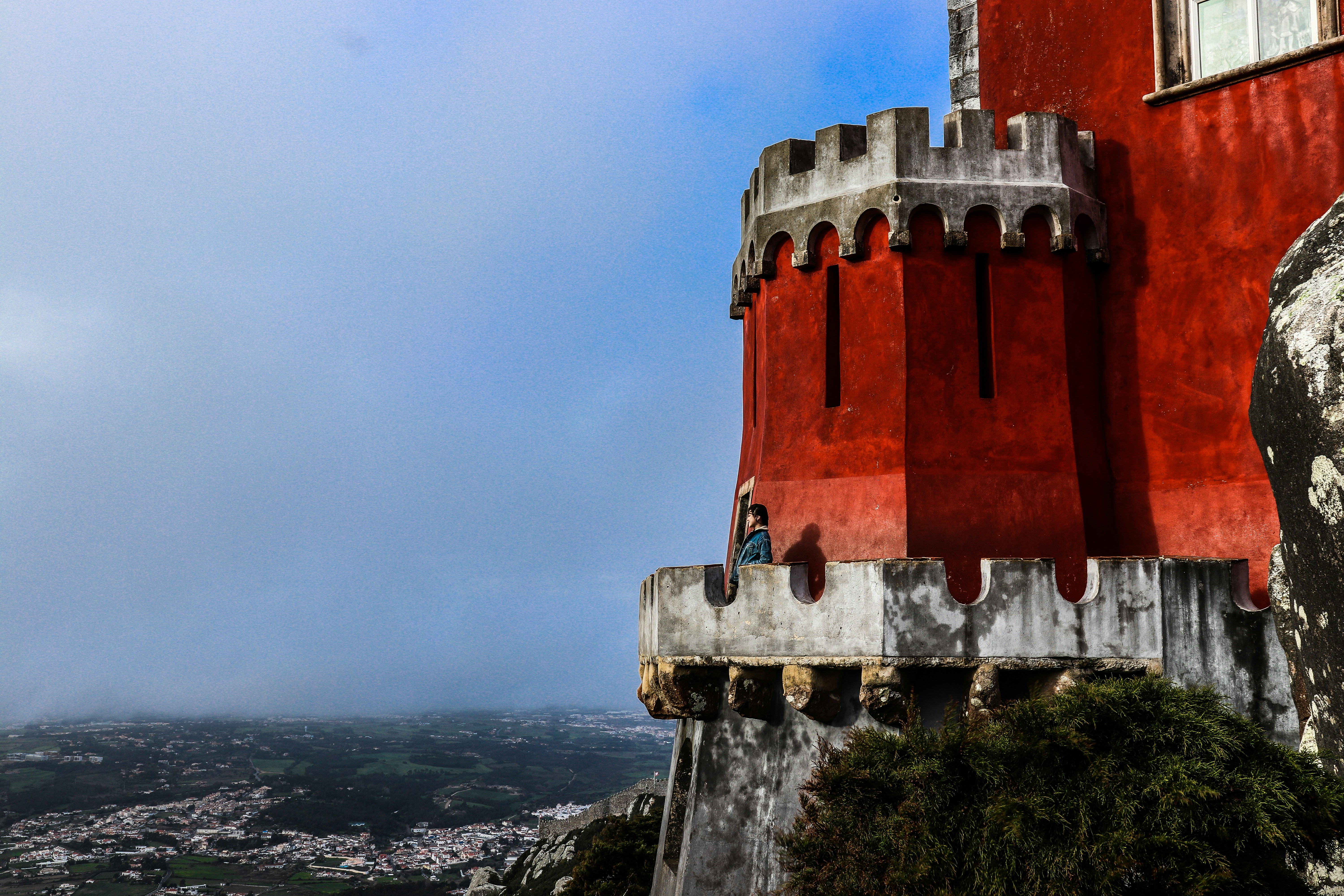 Red and white concrete building on top of mountain photo – Free Architecture Image on Unsplash