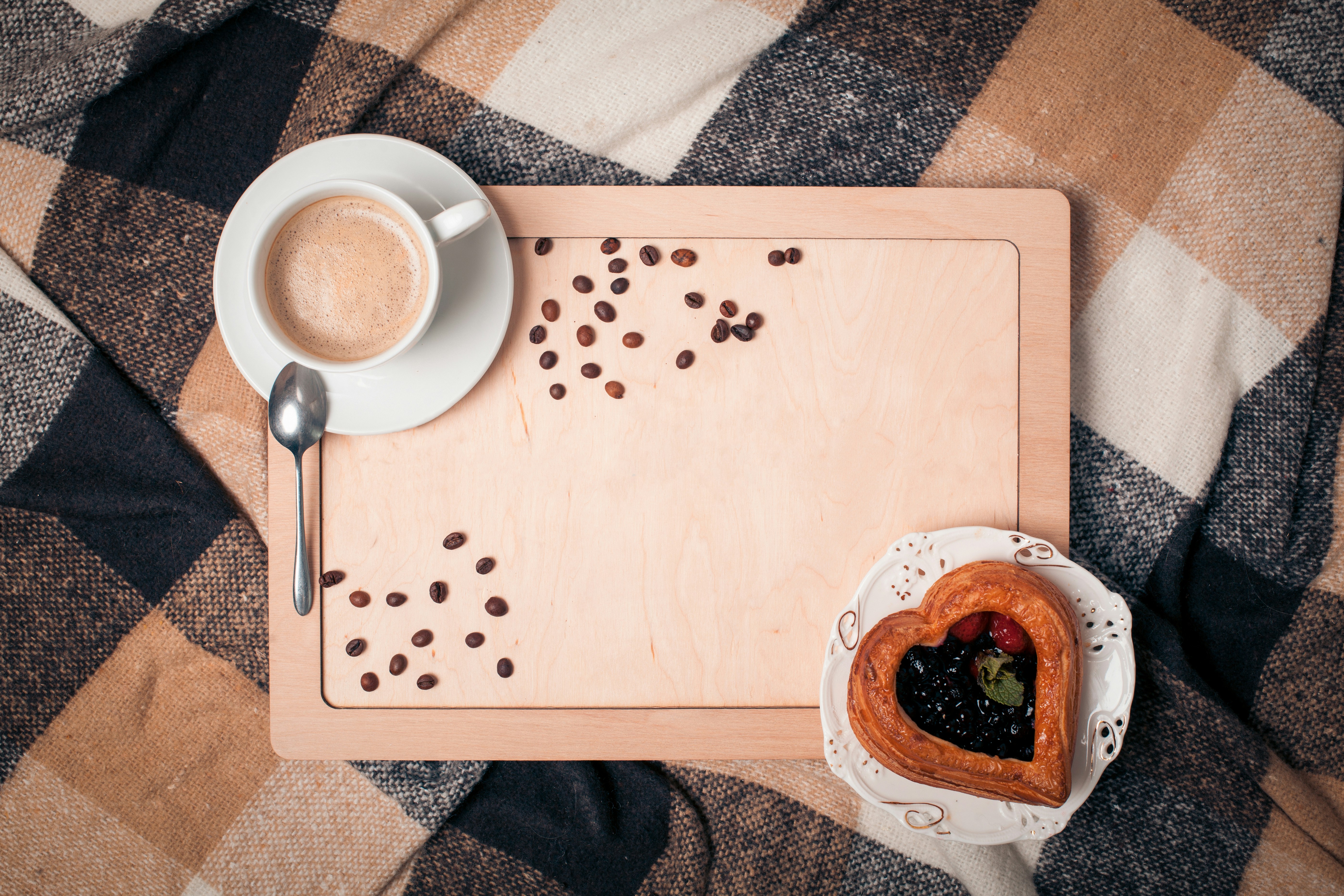 Heart-Topped Tart Anchored by a Quiet Cup