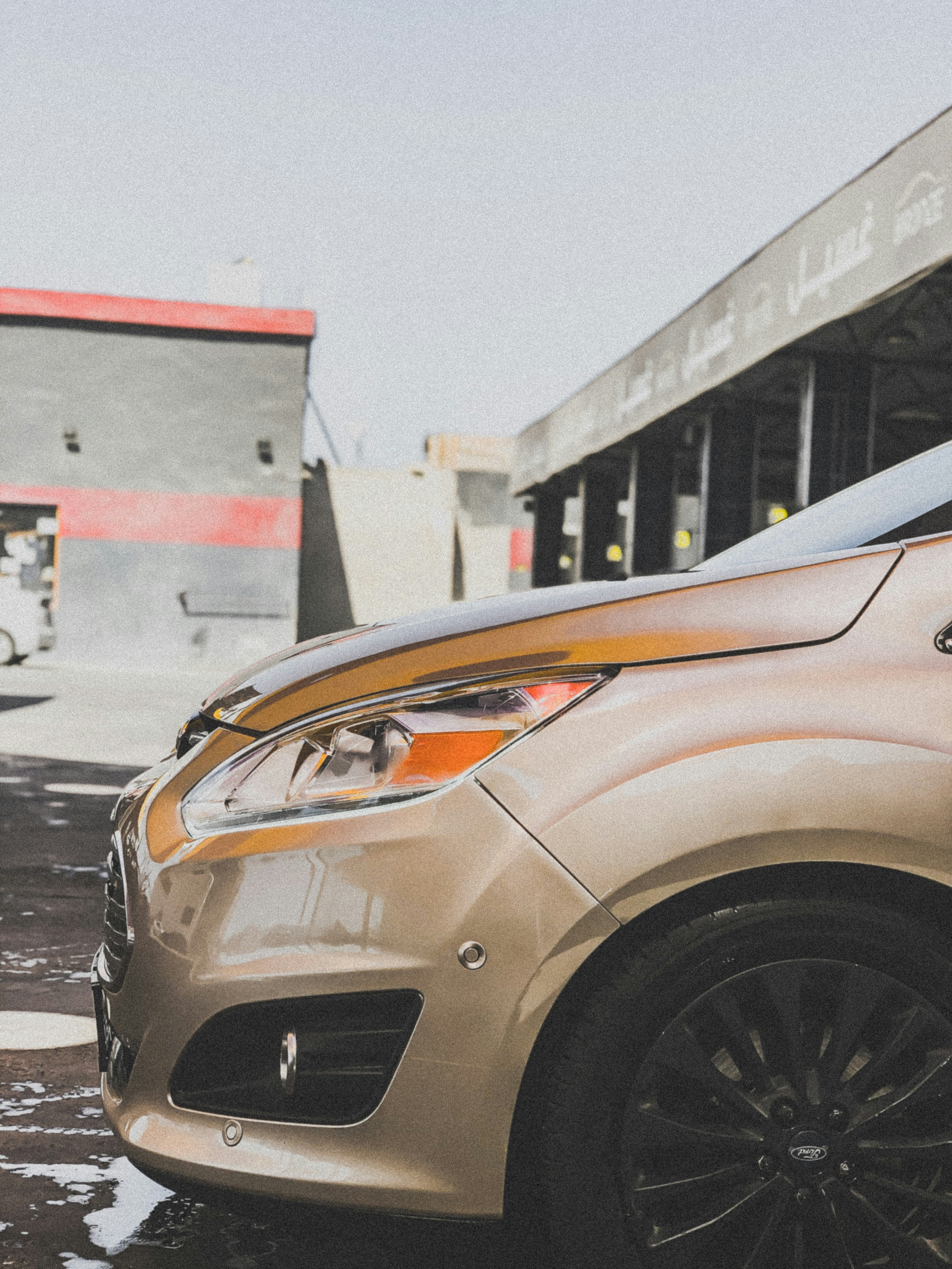 Golden Horizon: The Front-Quarter Portrait of a Shiny Street-Ready Sedan