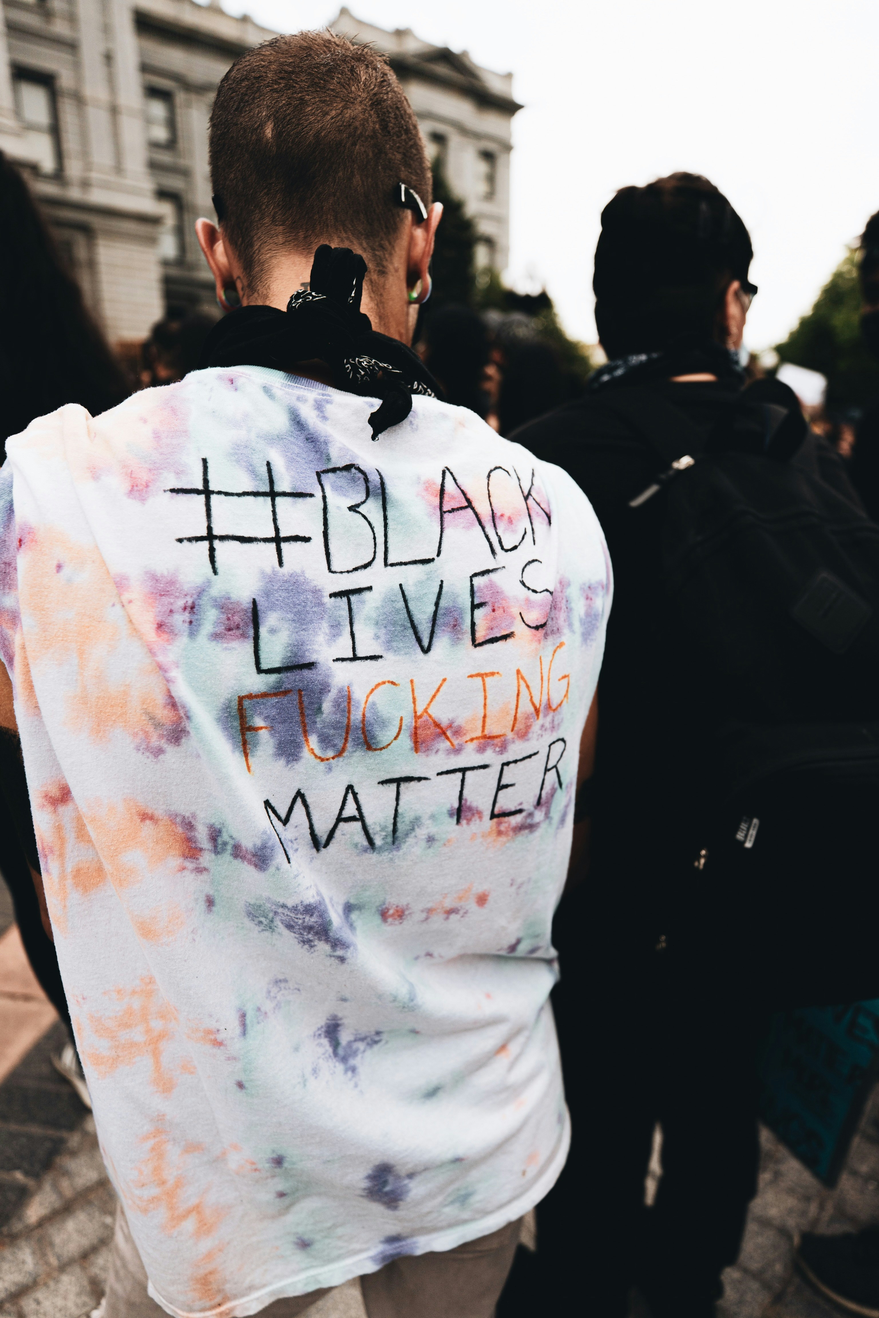 Tie-Dye Witness: The Back View that Amplifies a Protest's Message
