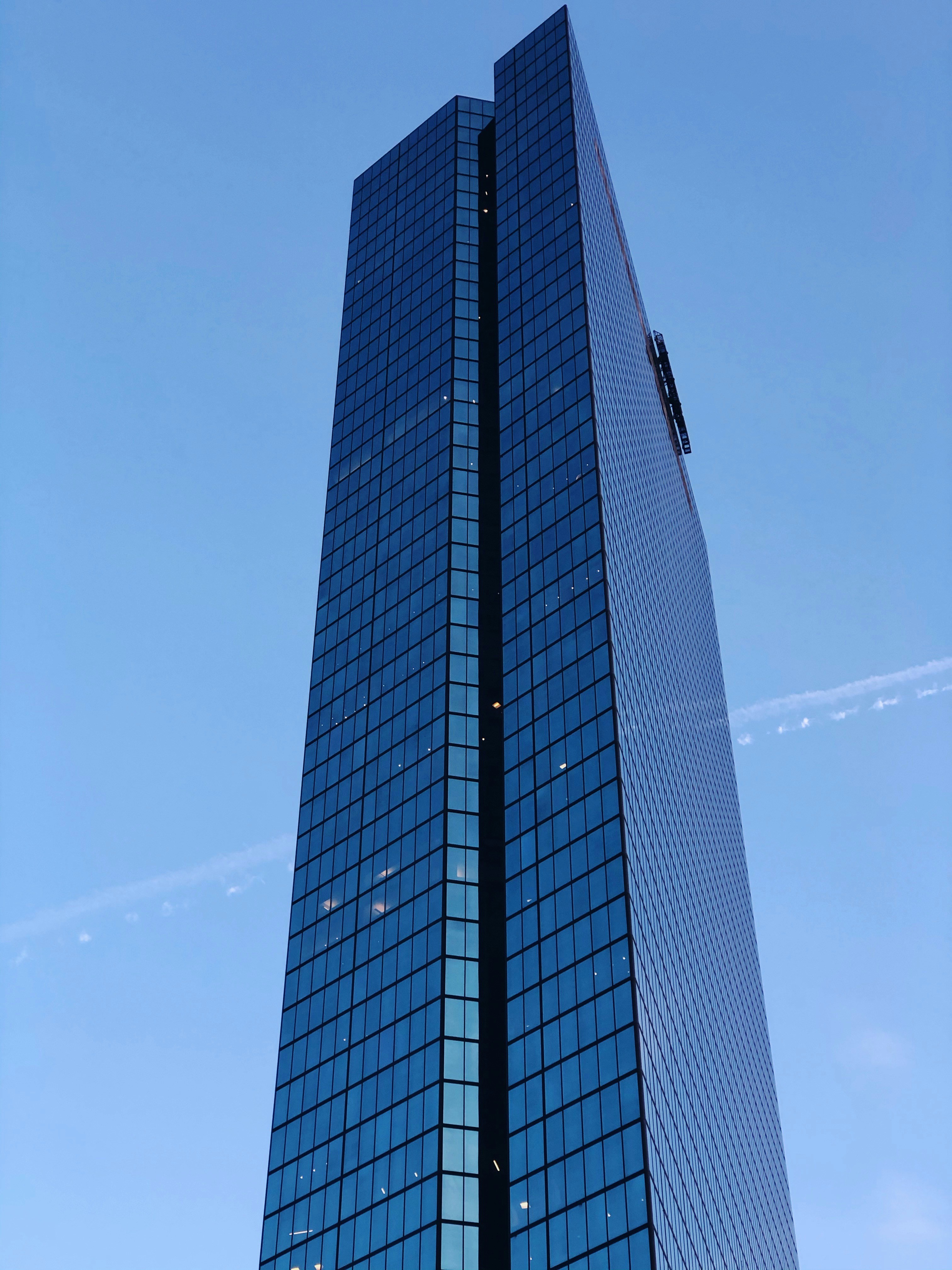 Black high rise building during daytime photo – Free Blue Image on Unsplash
