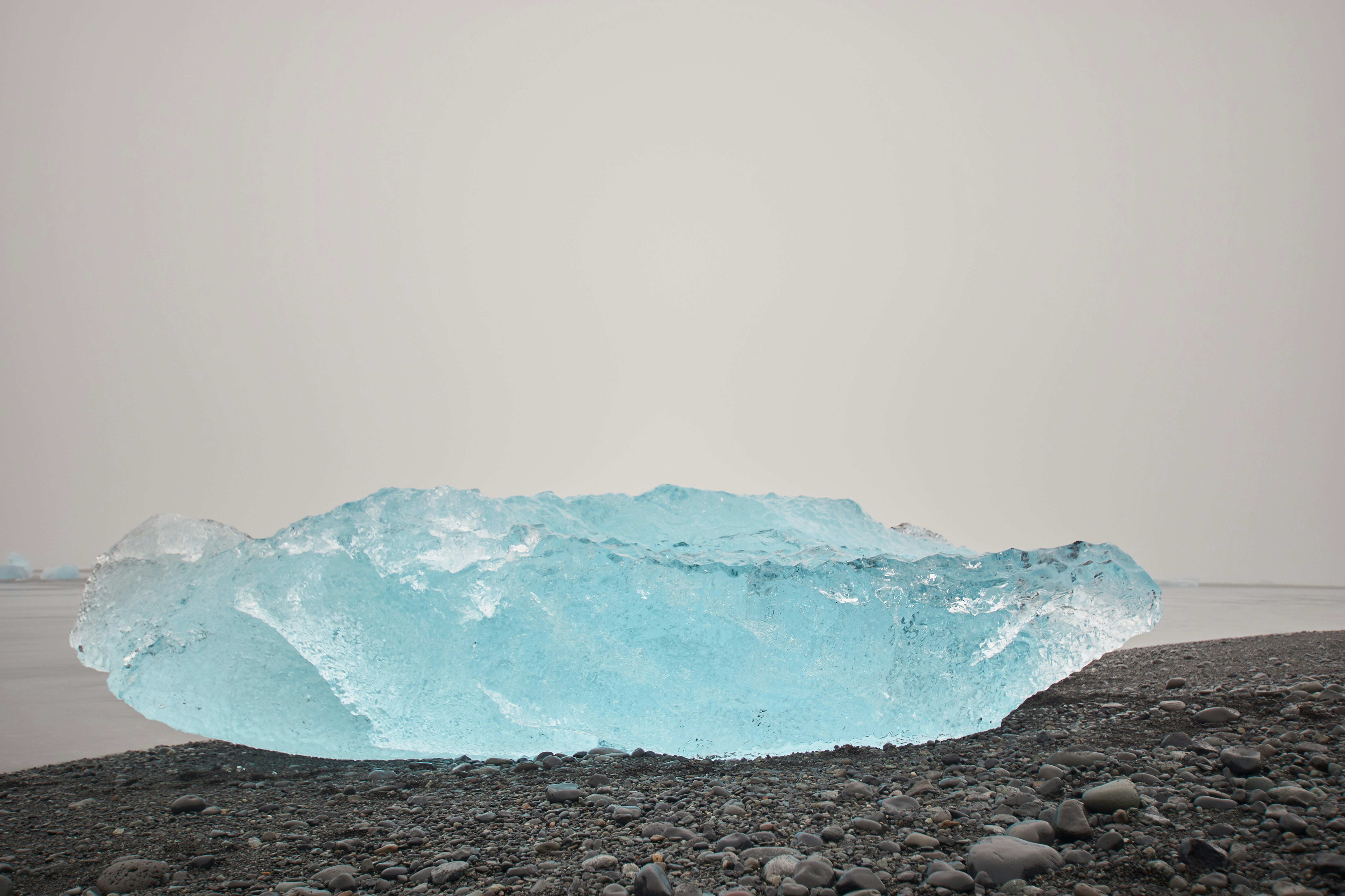 Azure Ice on a Shaded Beach