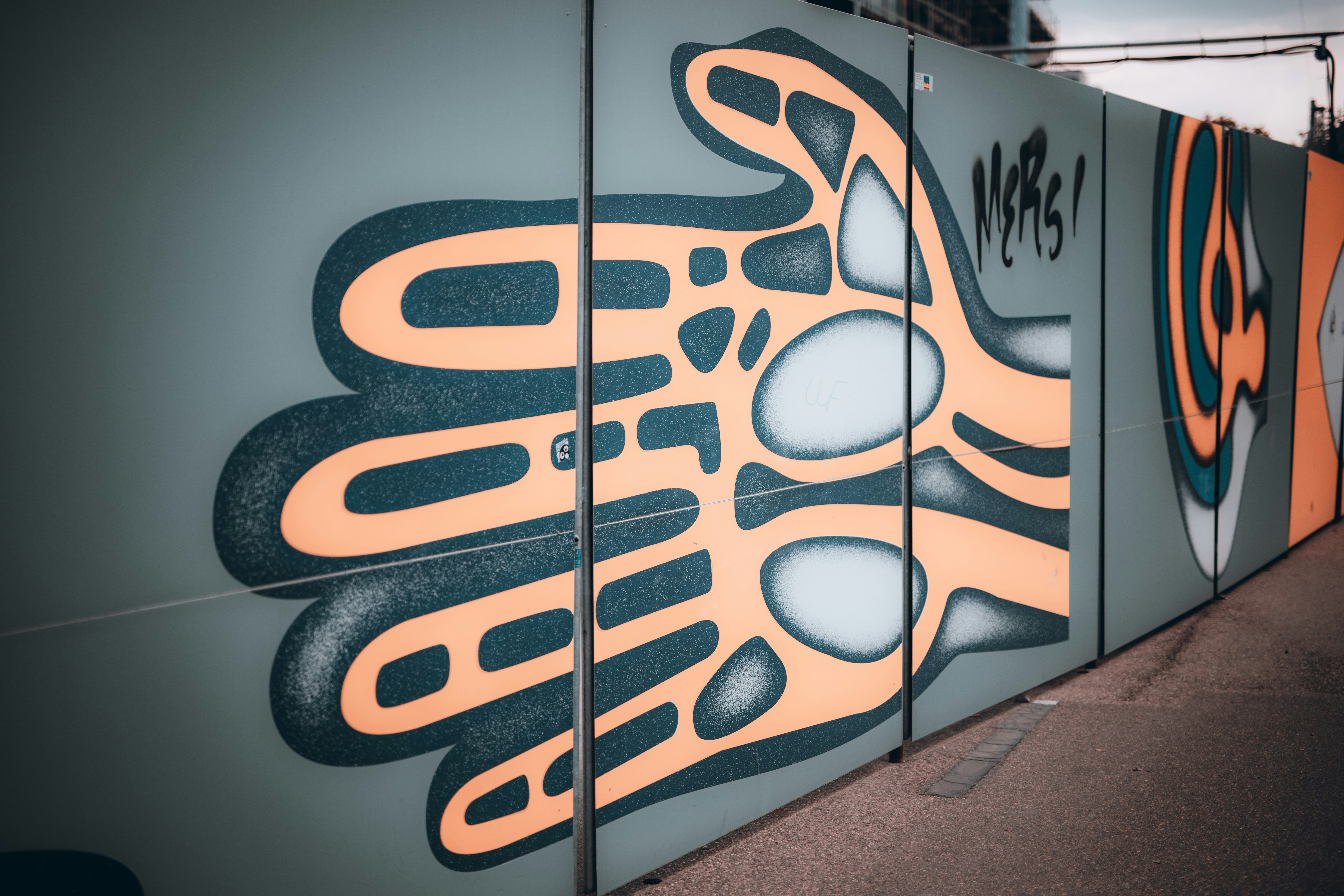 Graffiti Fingers: A Close-Up of Abstract Urban Hand Motif on Painted Panels