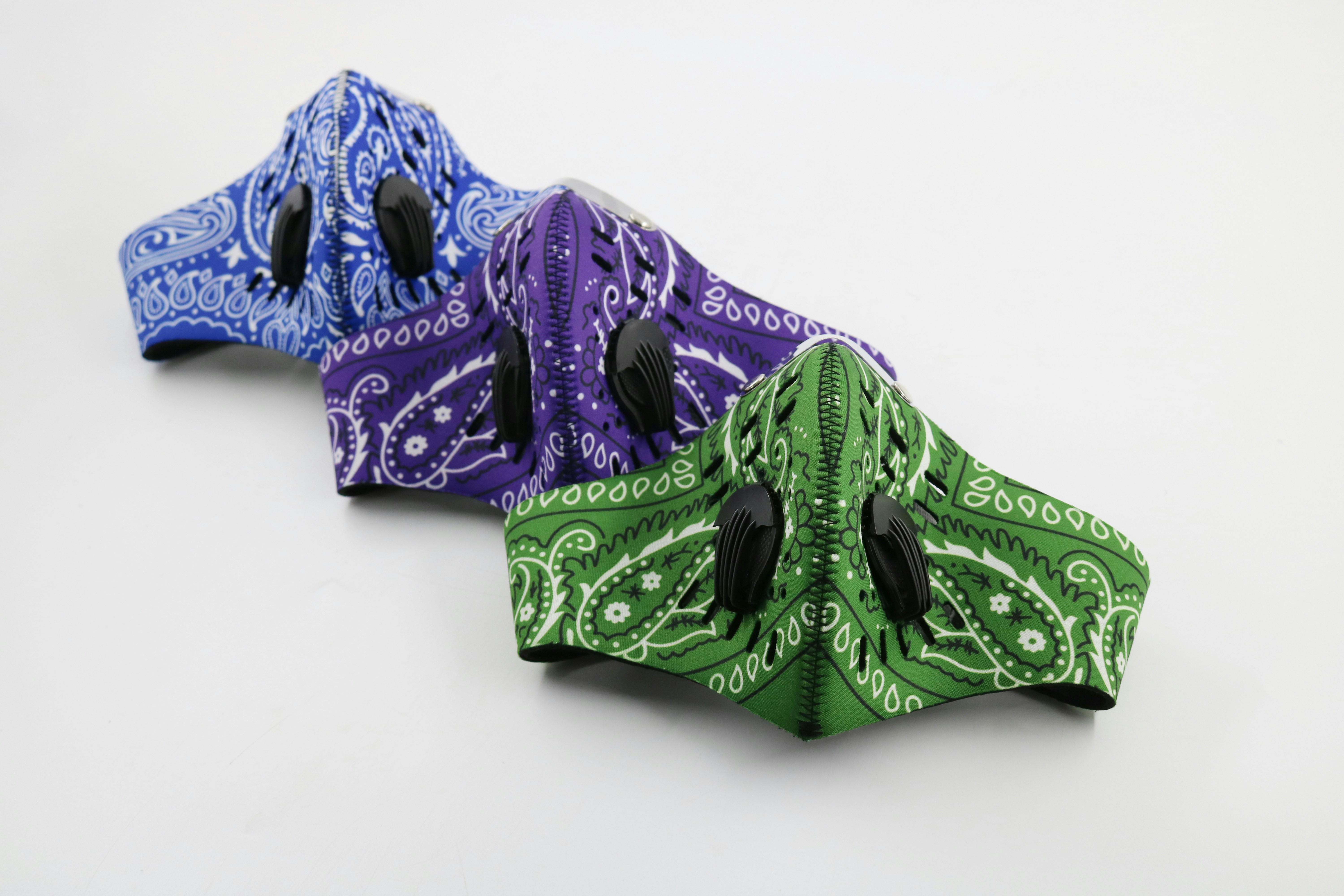 Triad of Paisley Masks: Blue, Purple, and Green on White
